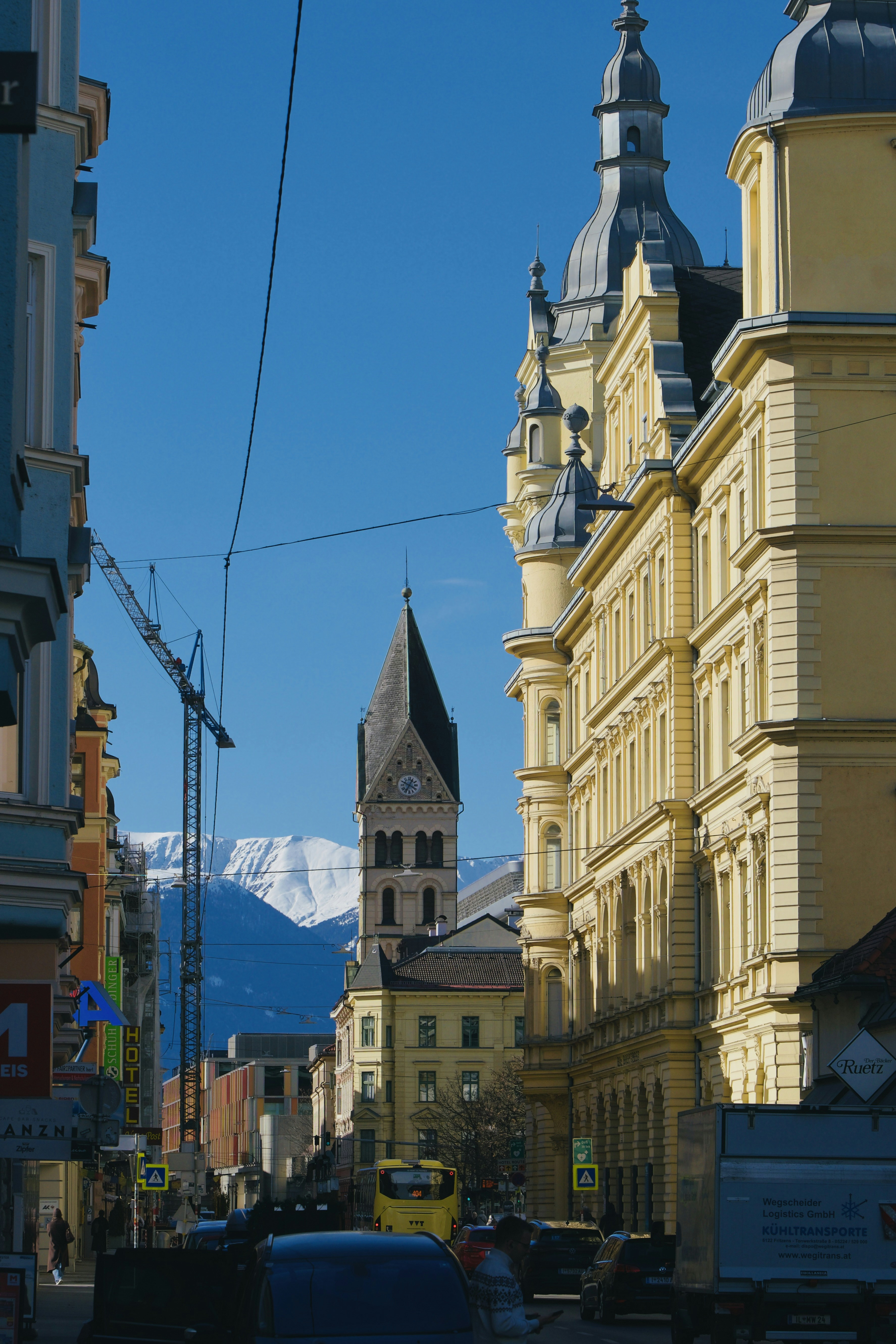 Golden Facade and Alpine Skyline