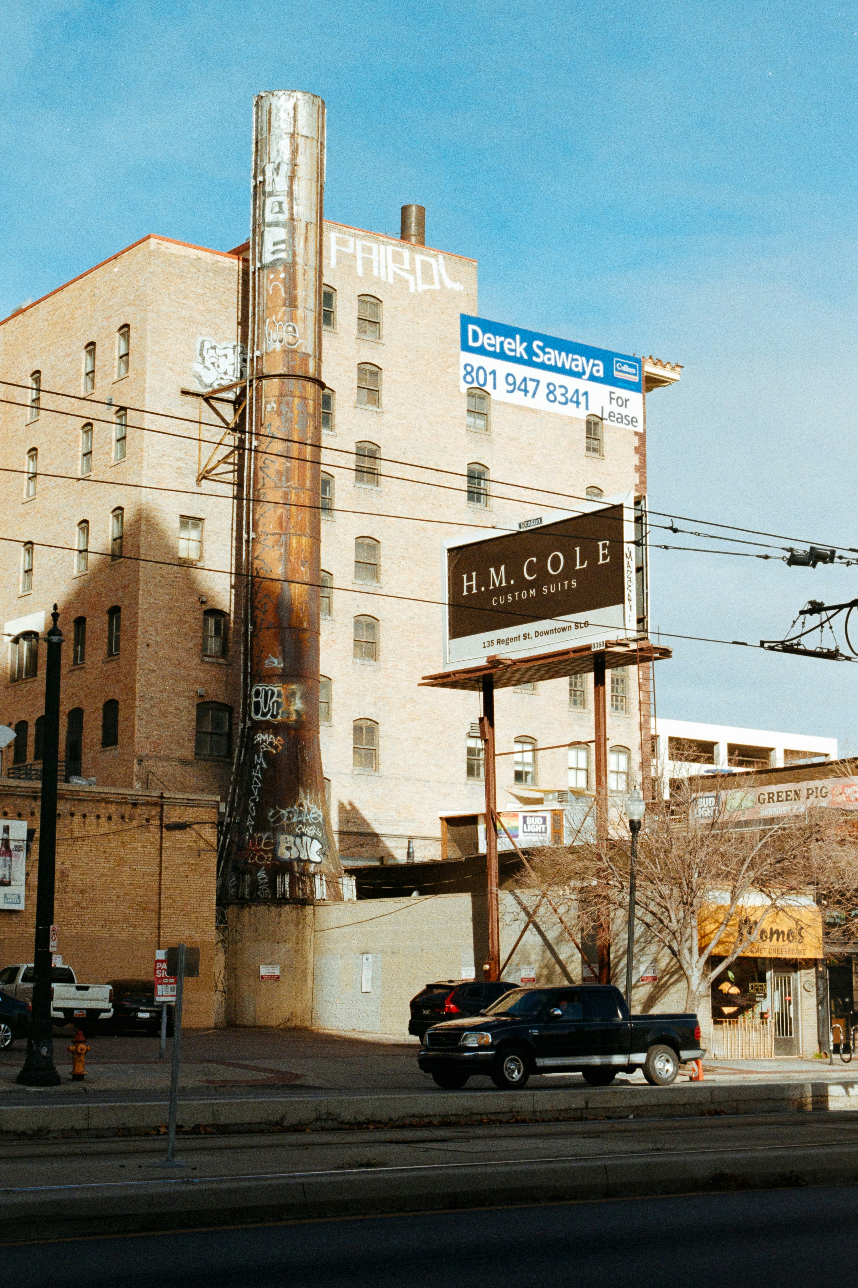 Midcentury City Facade with Towering Signage