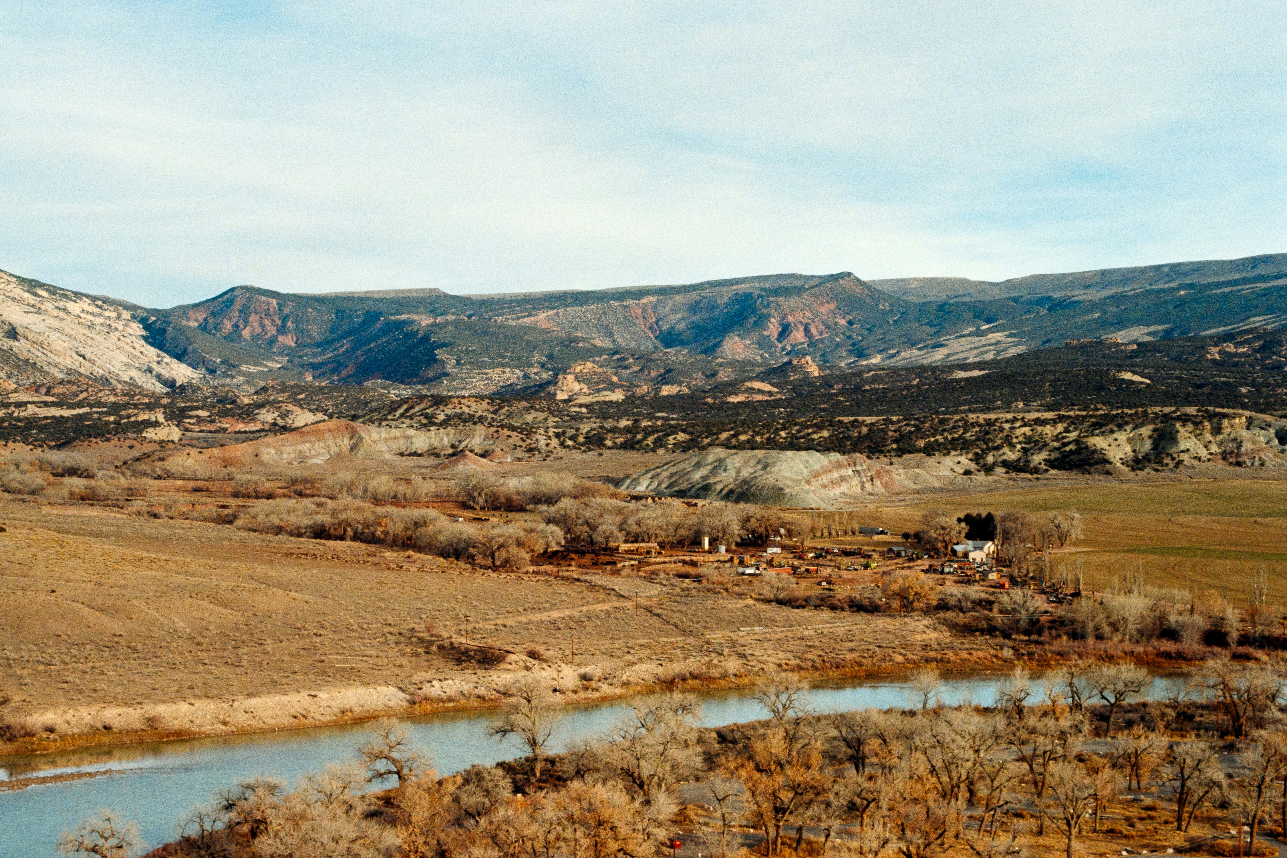 River valley with distant canyon and winter vegetation