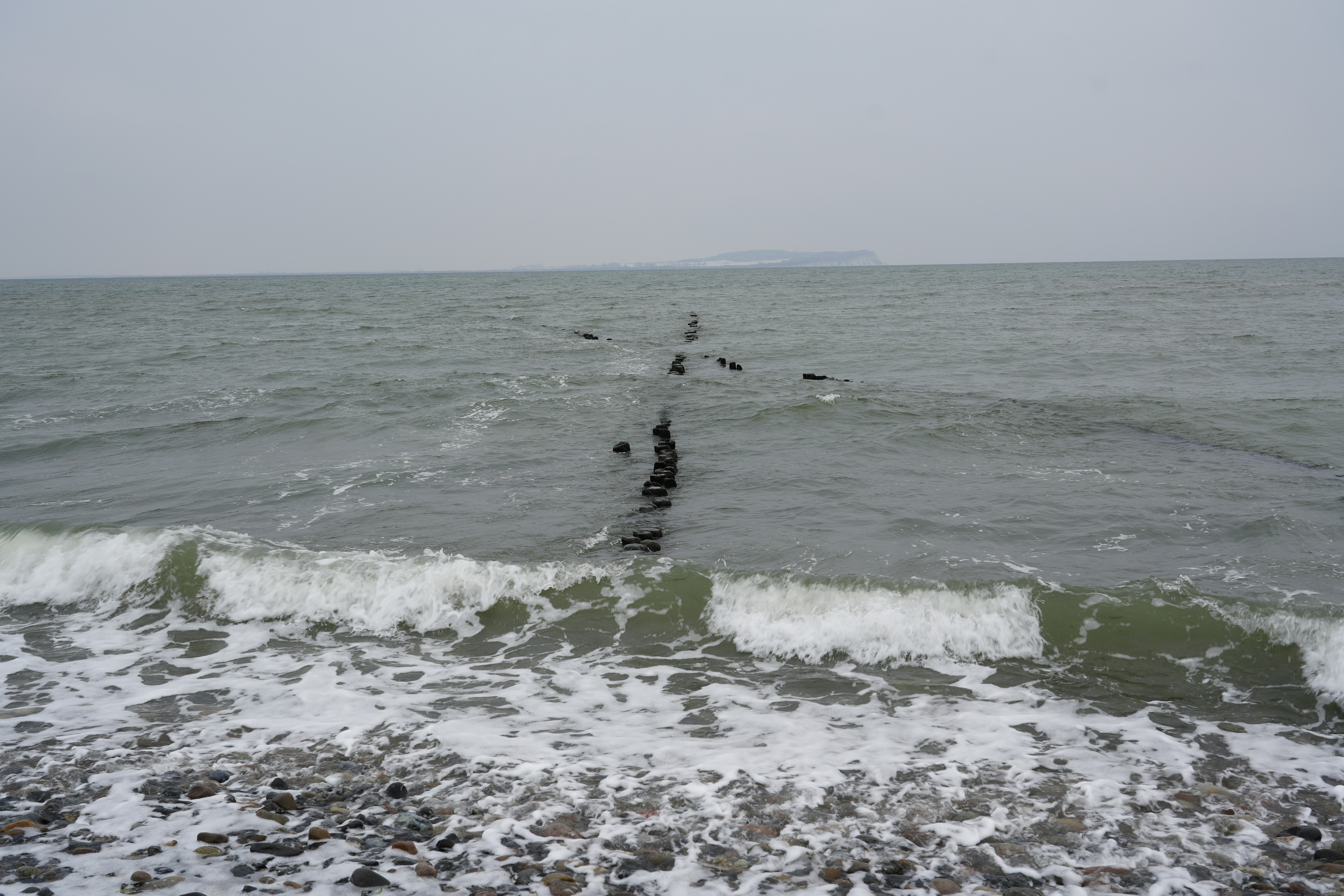 Sea Line of Stones: A Distant Break in the Ocean