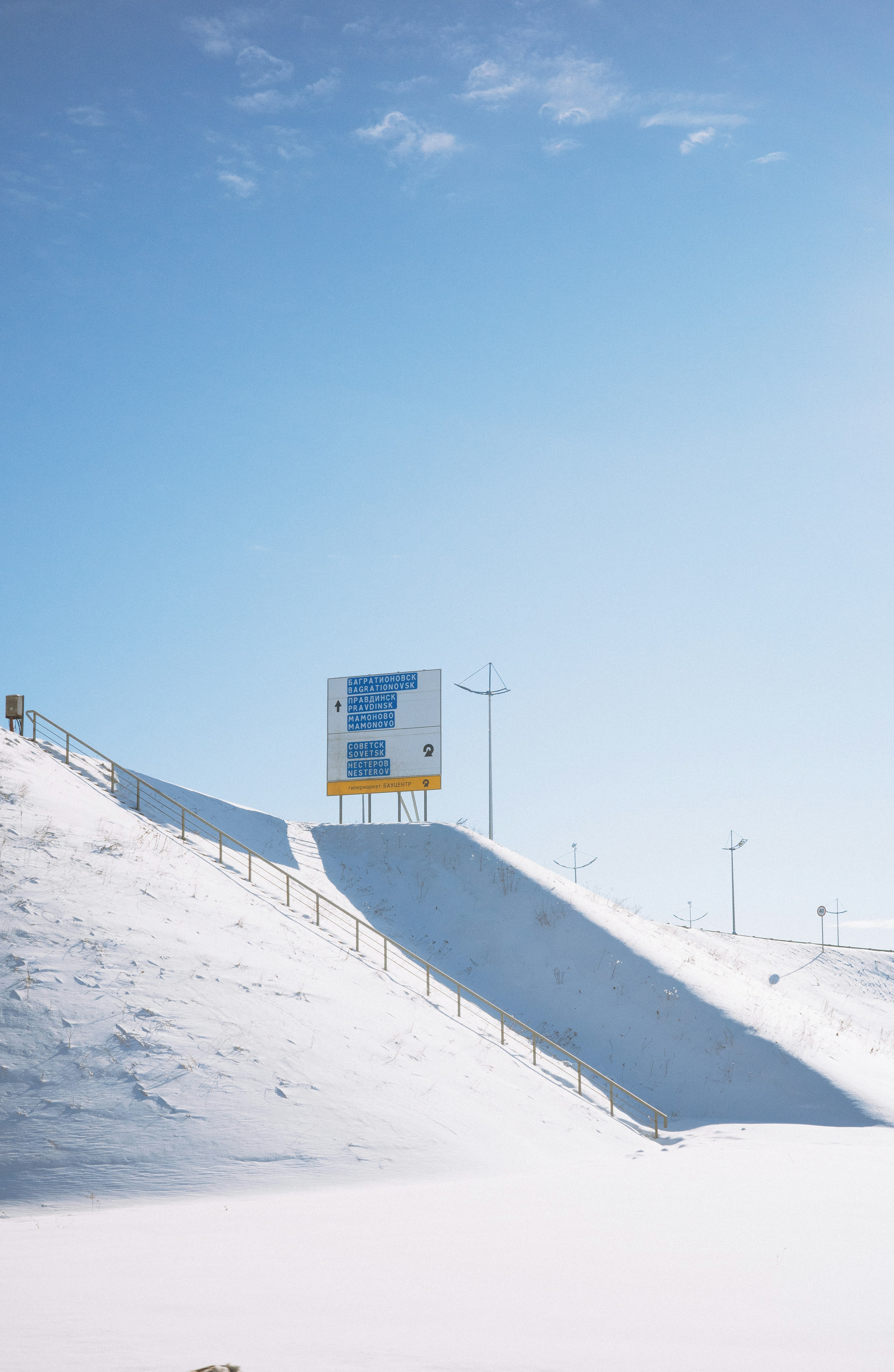 Snowbound Staircase under a Clear Blue Sky