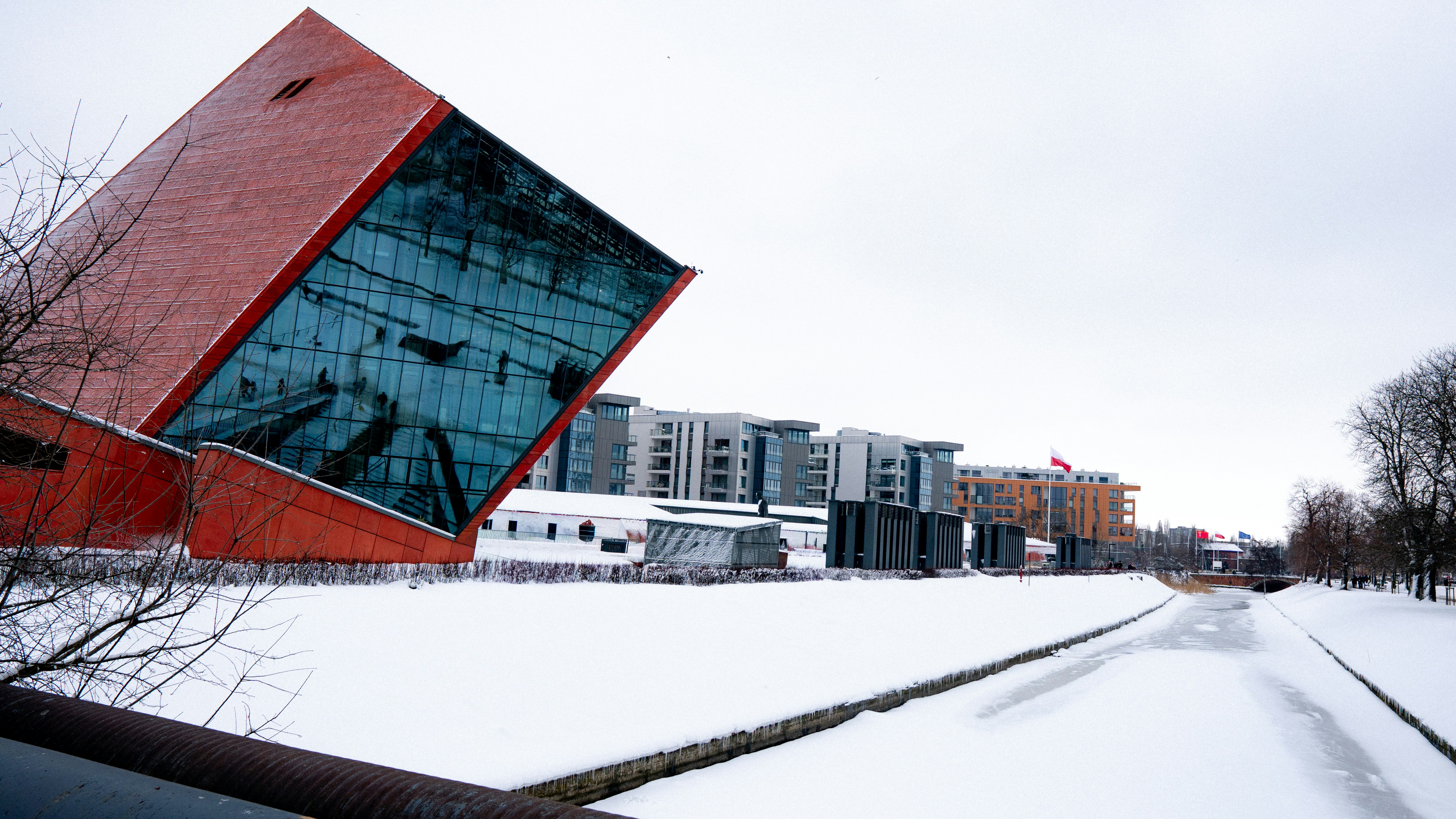 Tilted Glass Cube Over Winter Boulevard