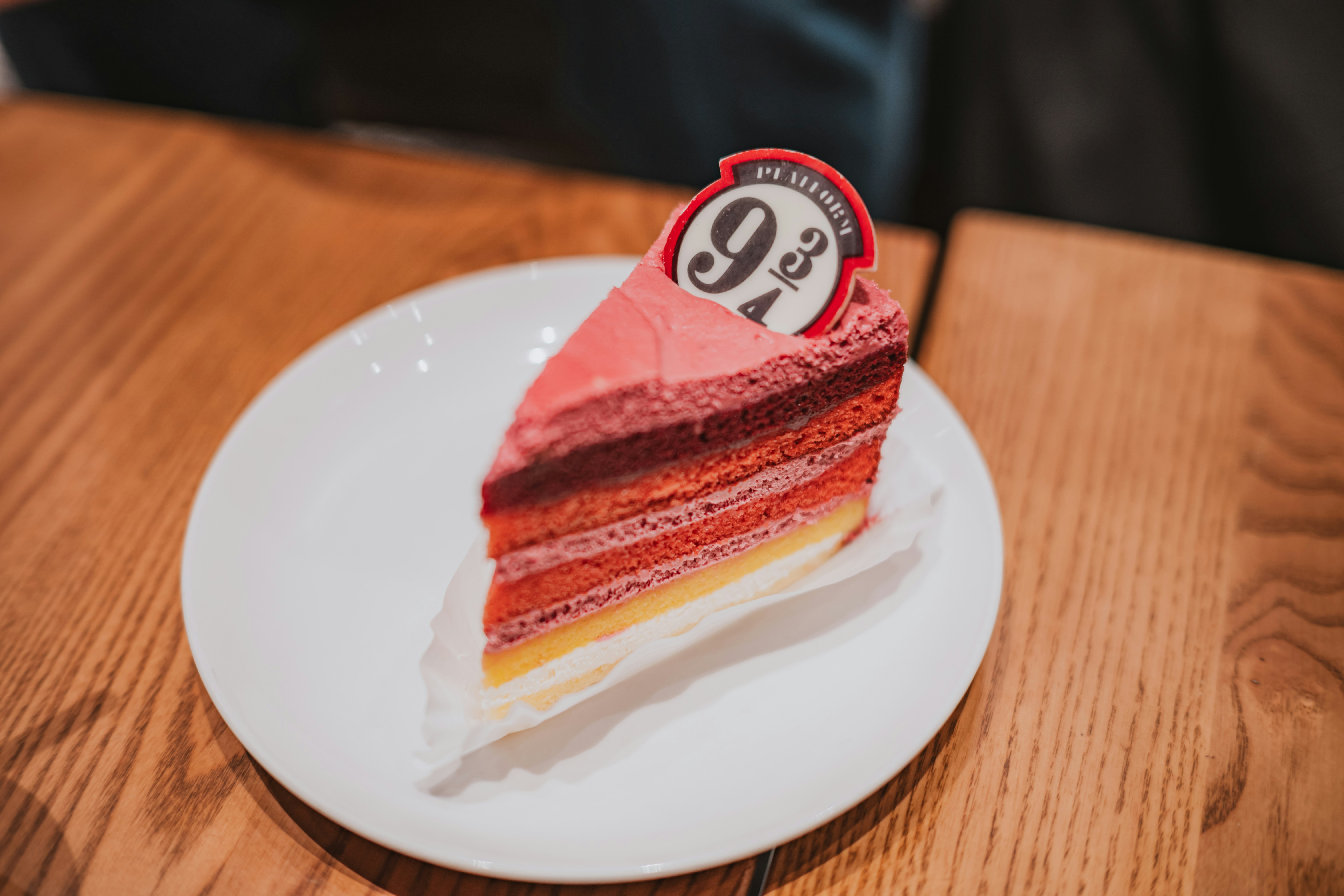 A Sliver of Strawberry Velvet on a White Plate