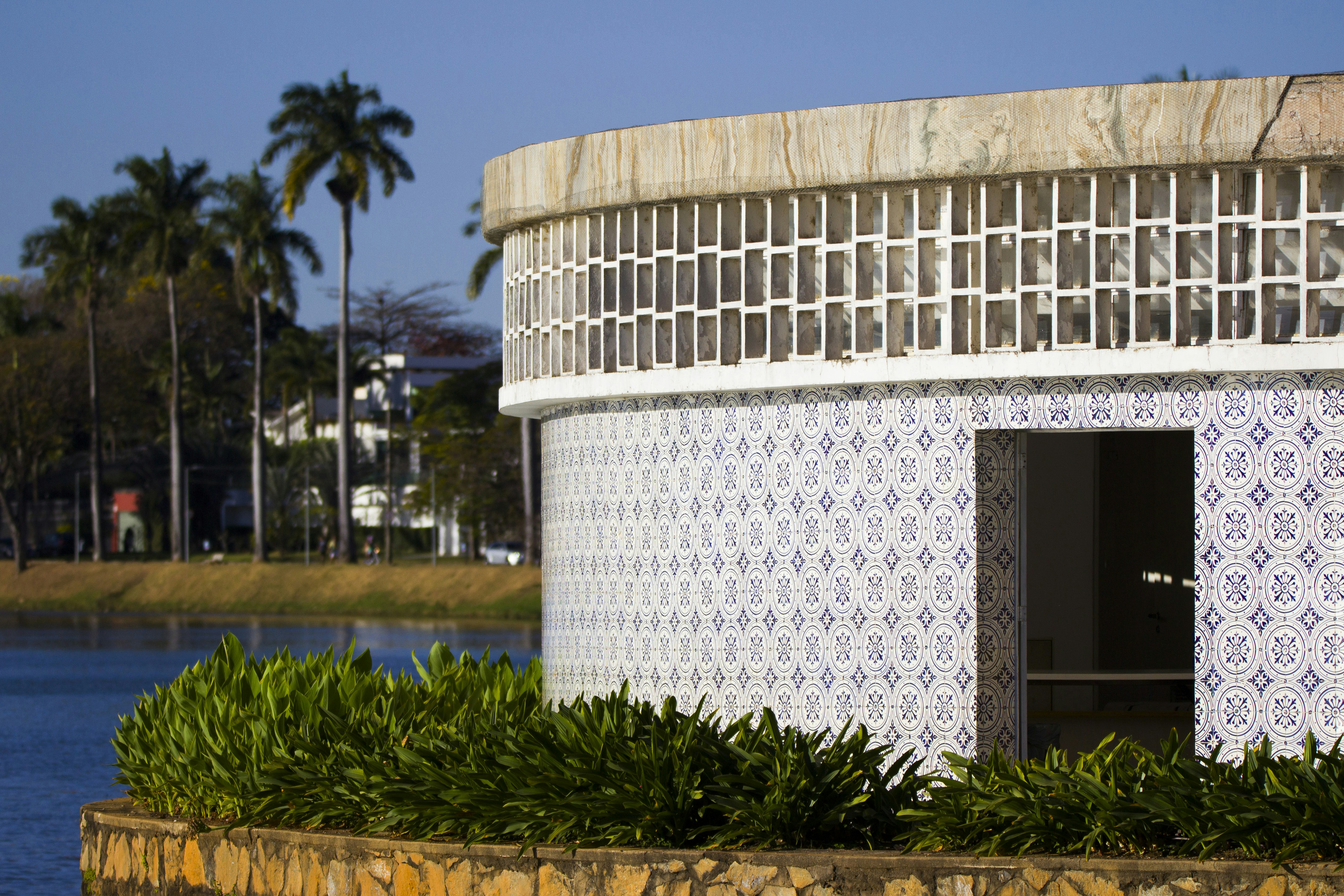Curved Tile Pavilion by the Waterline