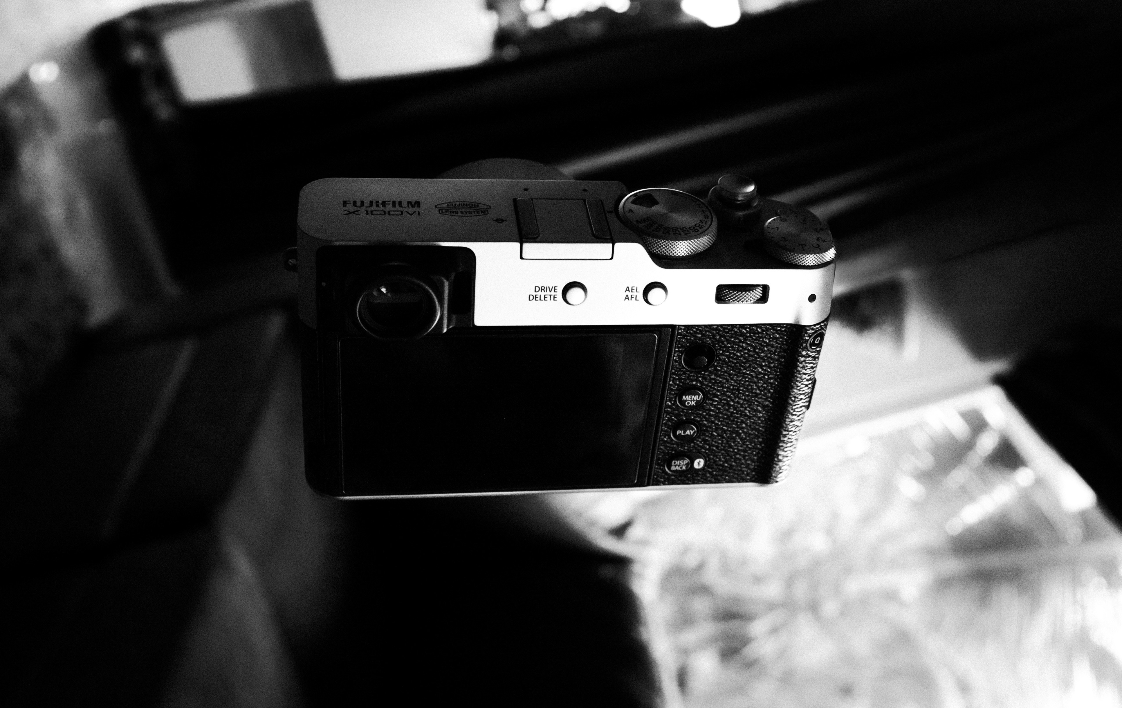 Vintage Mirror: A Fujifilm X100 Tucked in Shadow