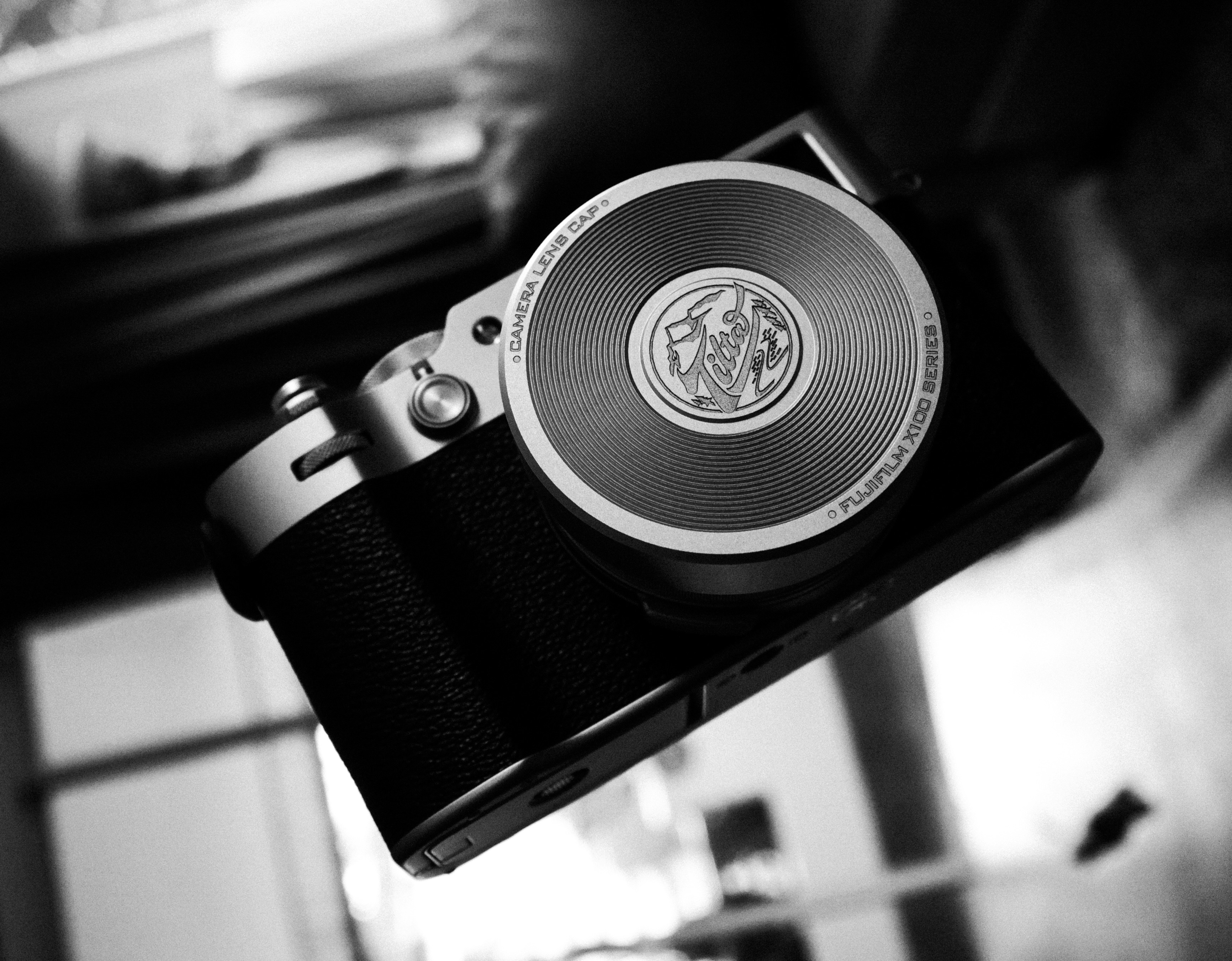 Chrome Quiet: A Vintage Leica-like Rangefinder Hovering in a Soft Blur