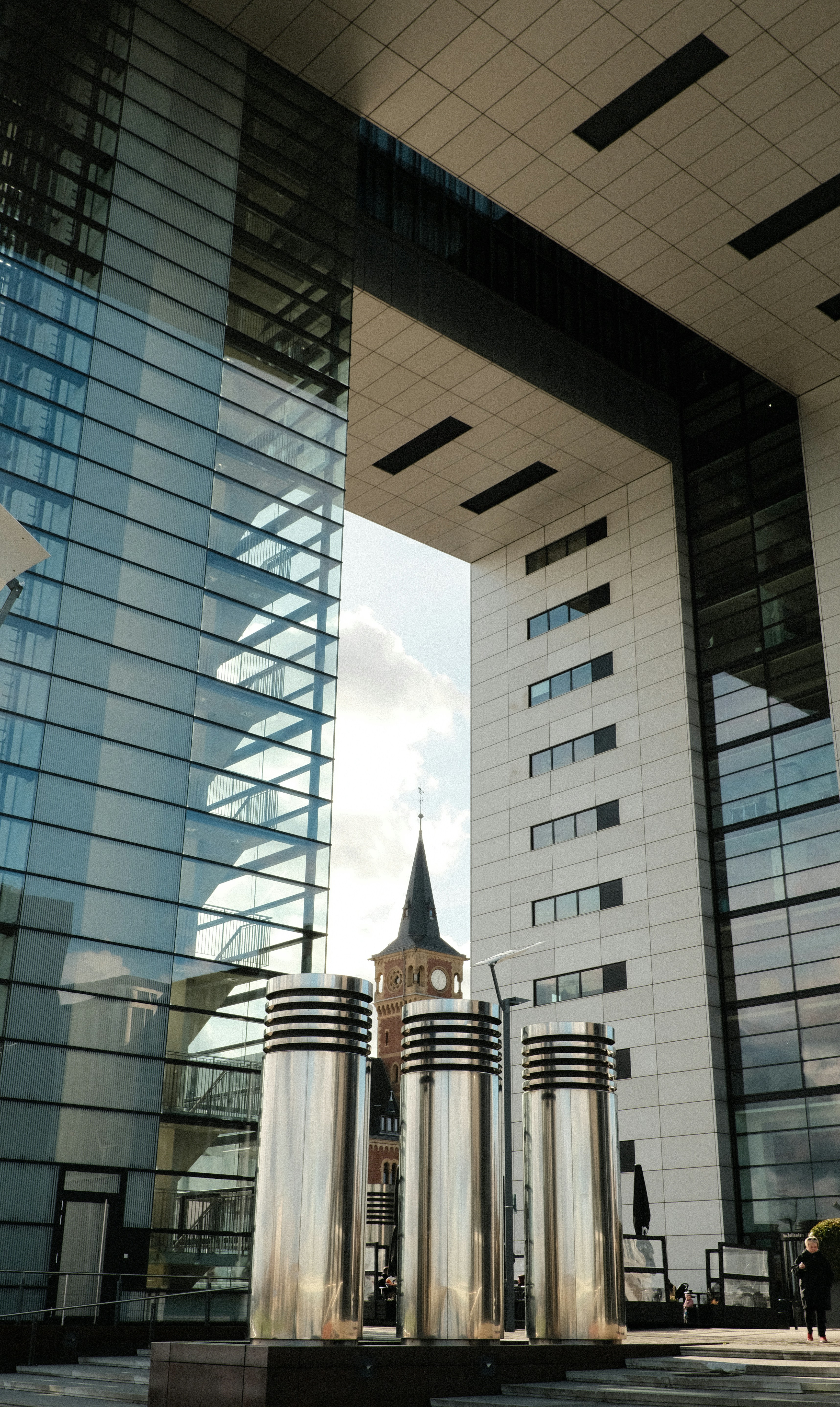 Urban Cathedral: Reflections and Steel Spires Framing a Church
