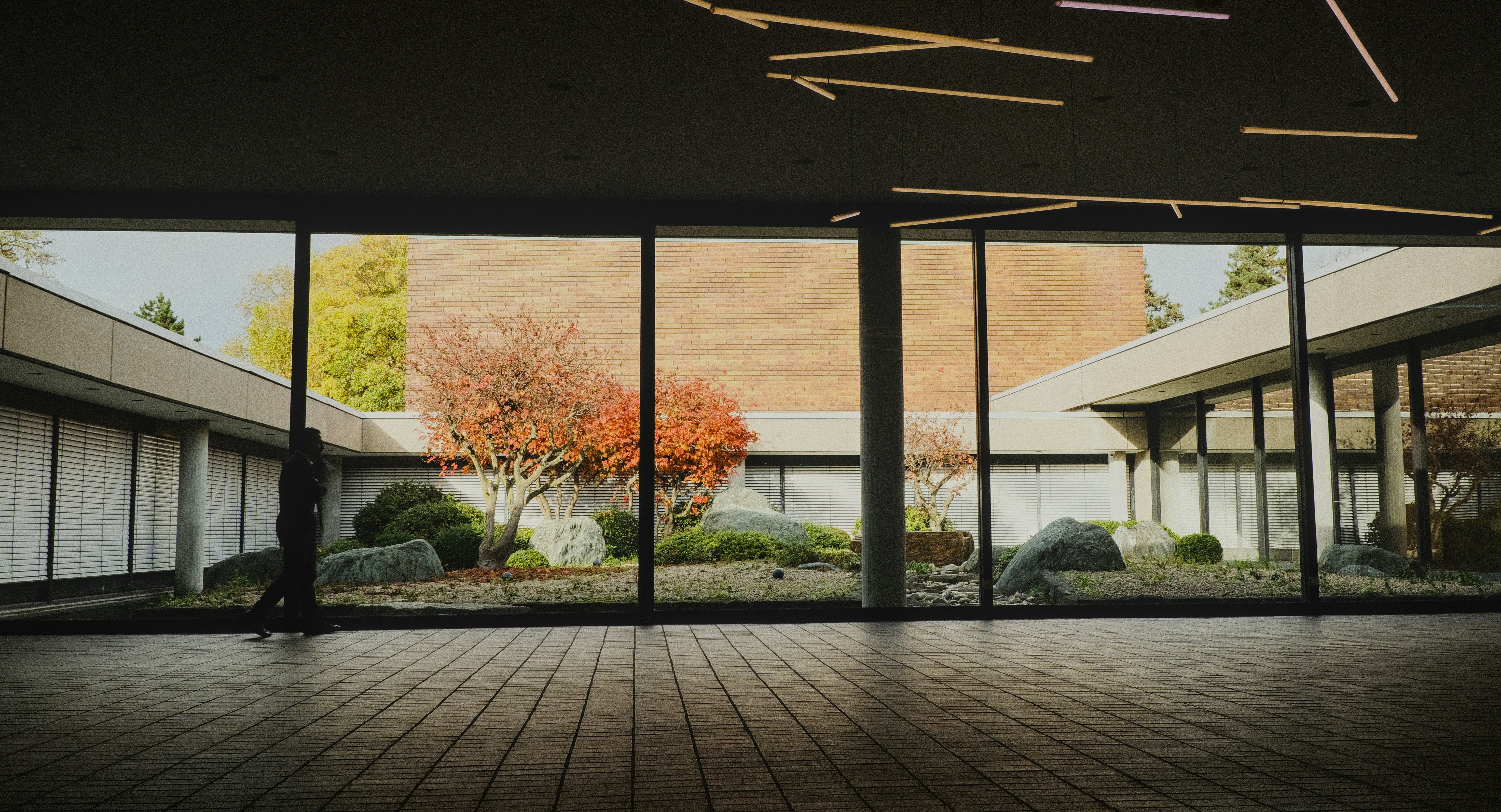 Silent Atrium Echoes: A Quiet Moment Inside Modern Glass and Stone