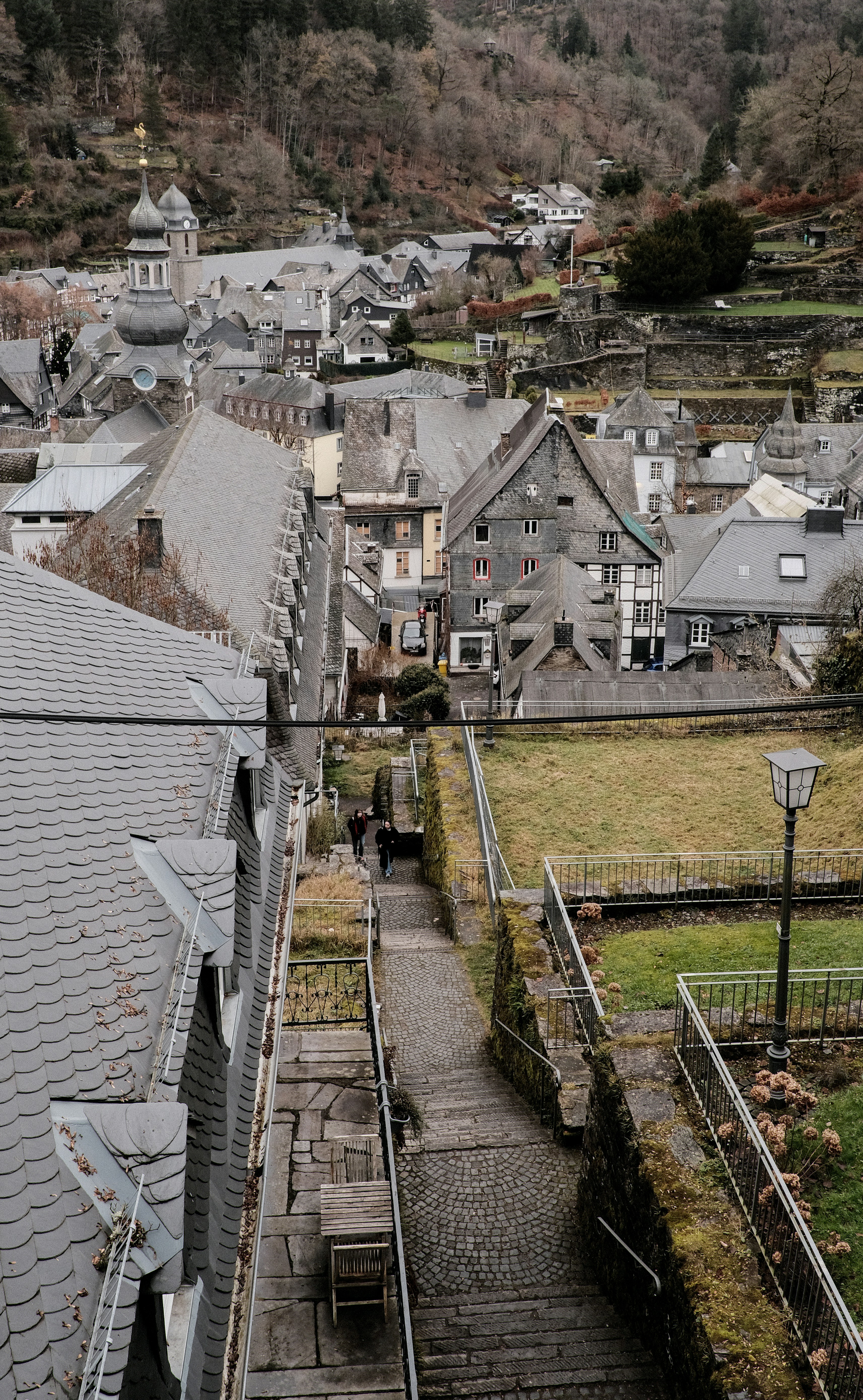 Rooftop Alley: A medieval village stairway winds toward timeless stone