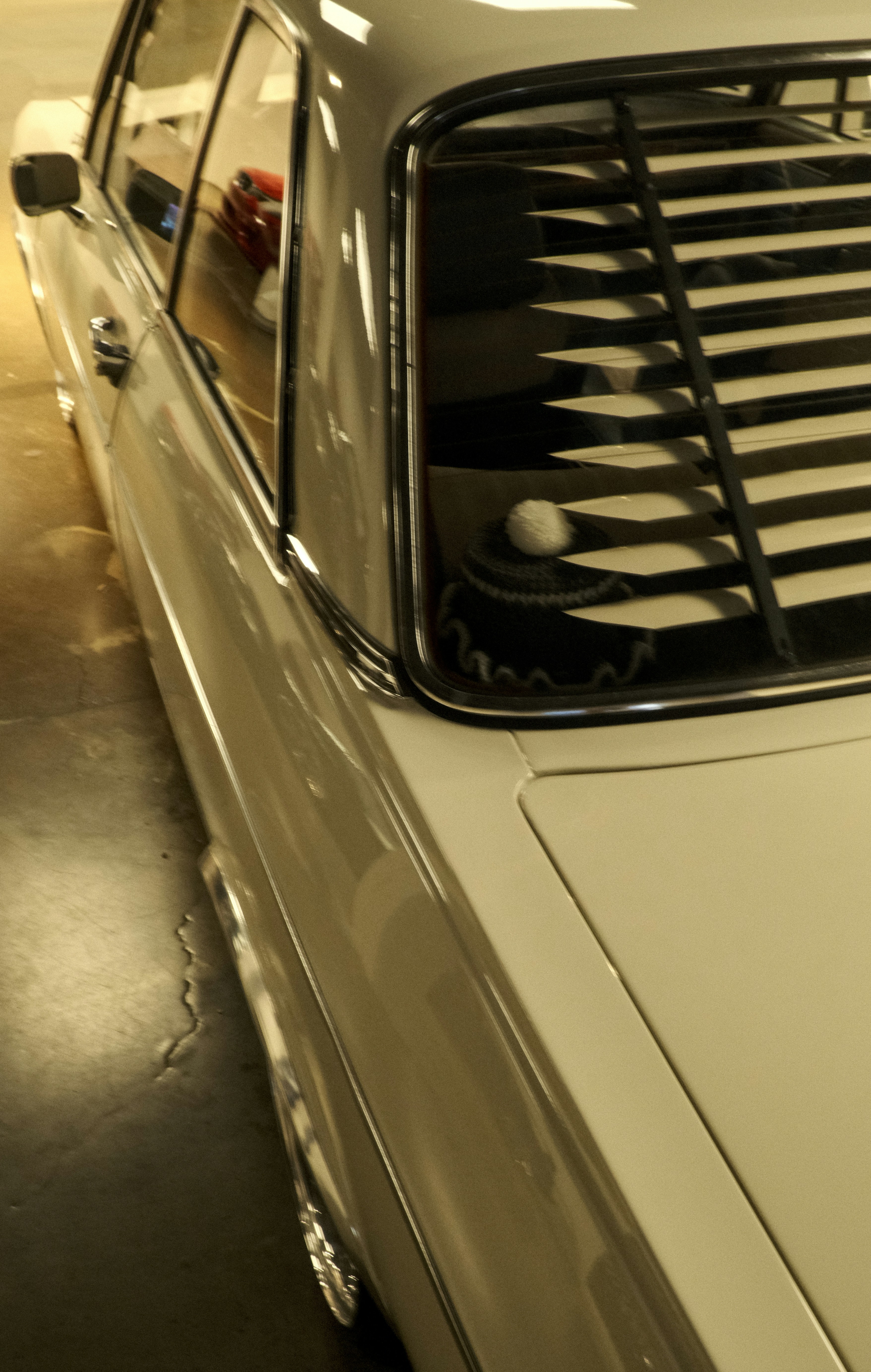 Chrome Edge: A Vintage Car Revealed Through Reflections