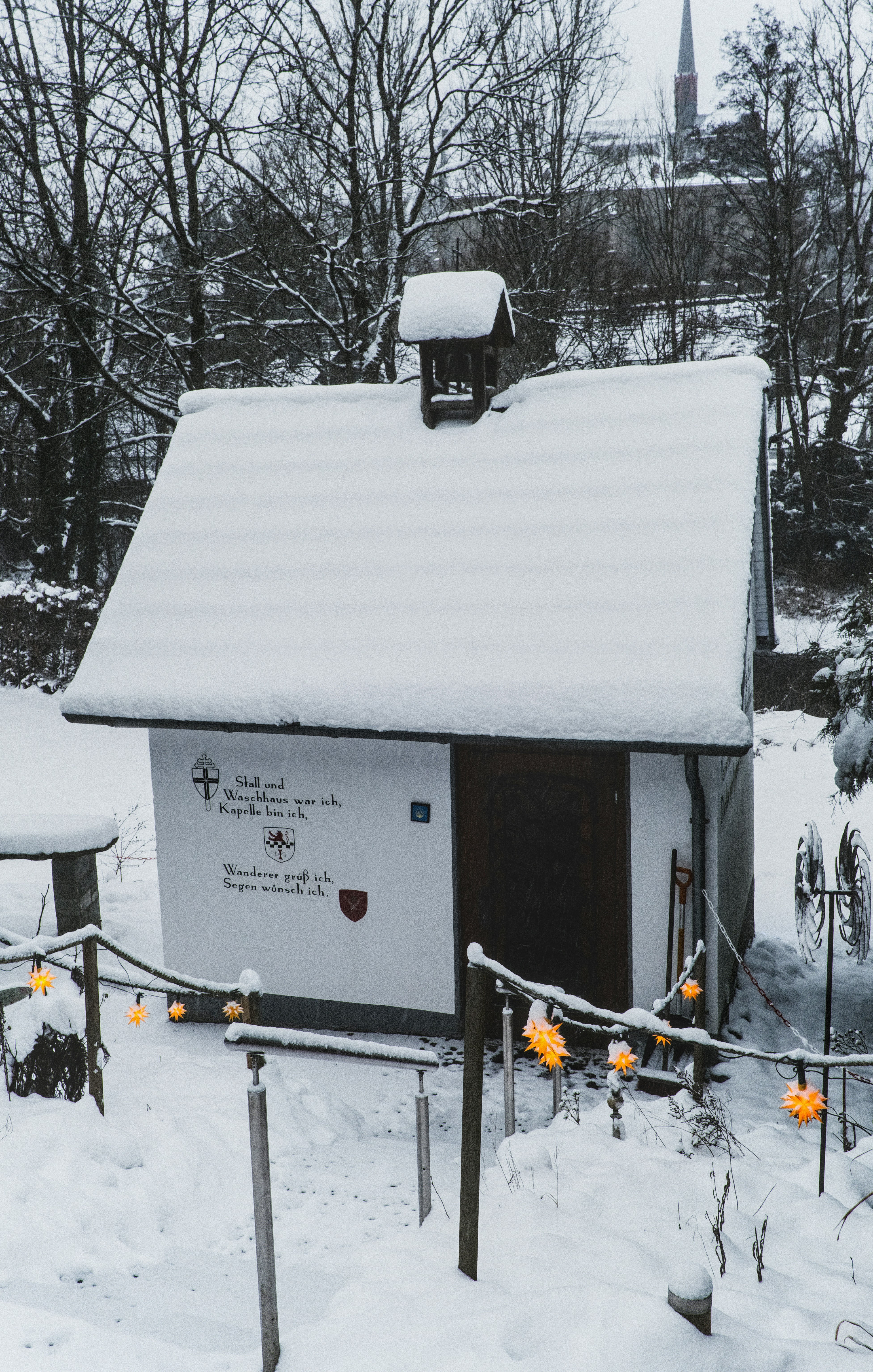 Snow-Covered chapel under a quiet winter sky