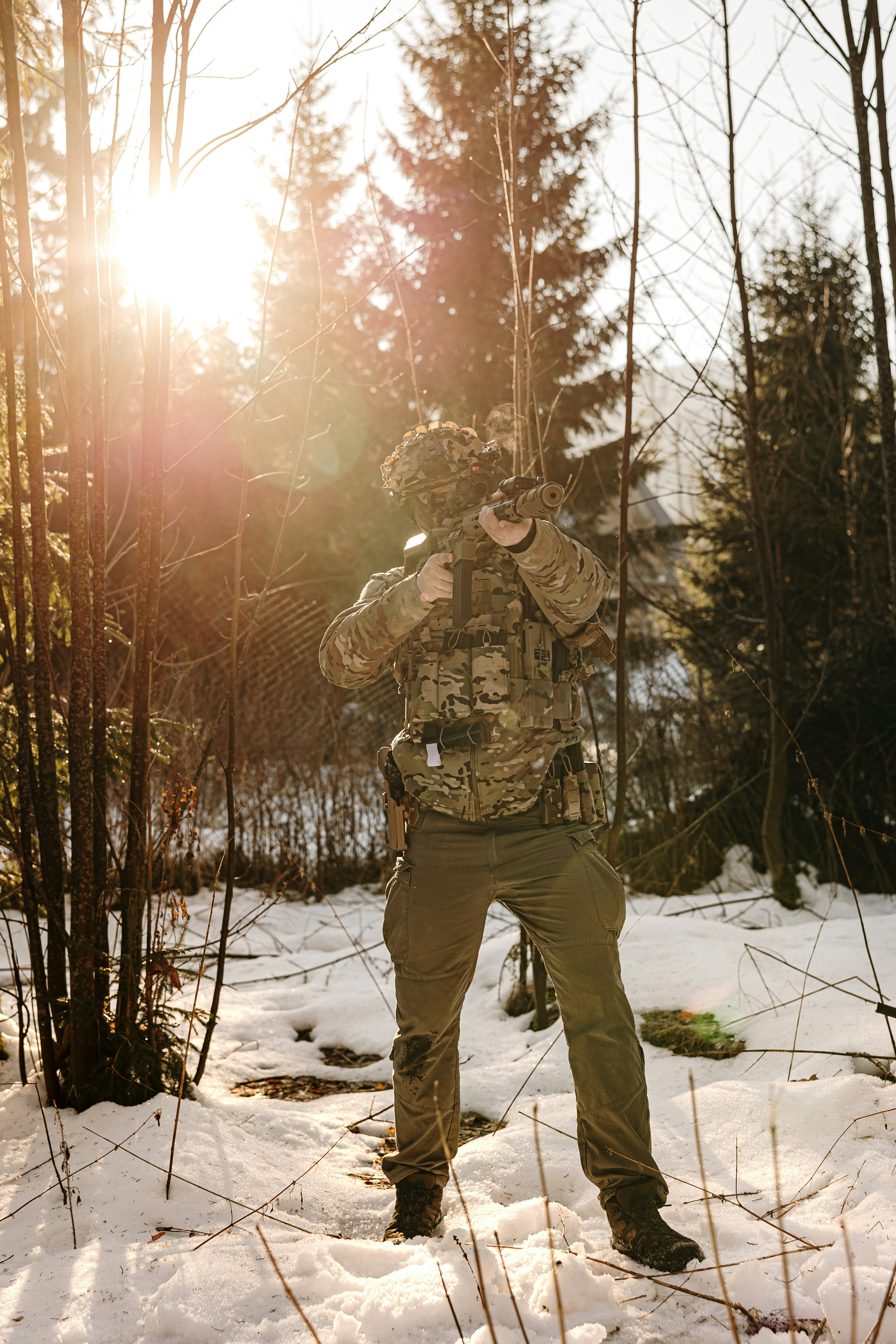 Snowbound Marksman: Focus Amid Flickering Pines