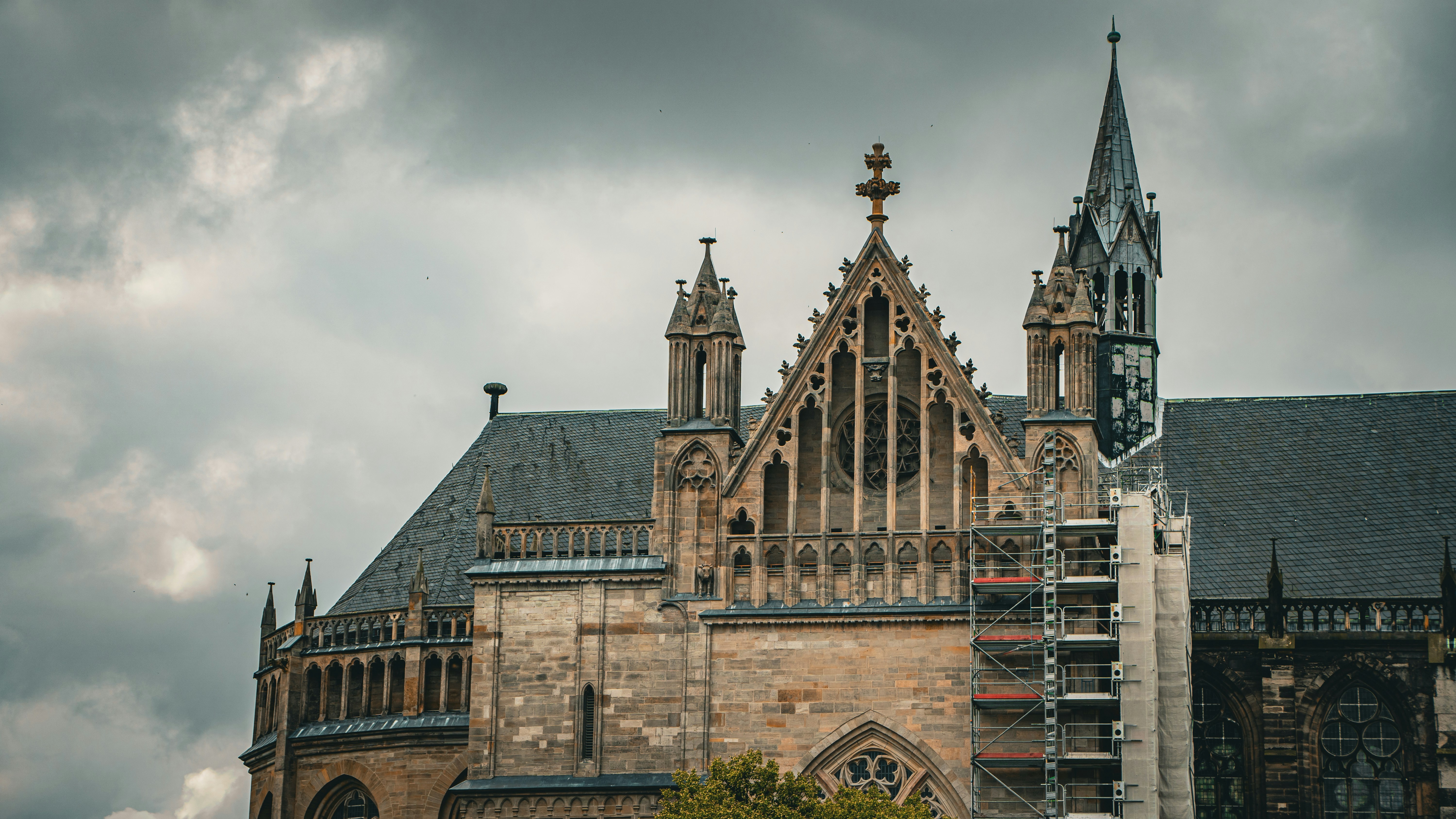 Stone Cathedral Ascent: Scaffolding at the Central Facade