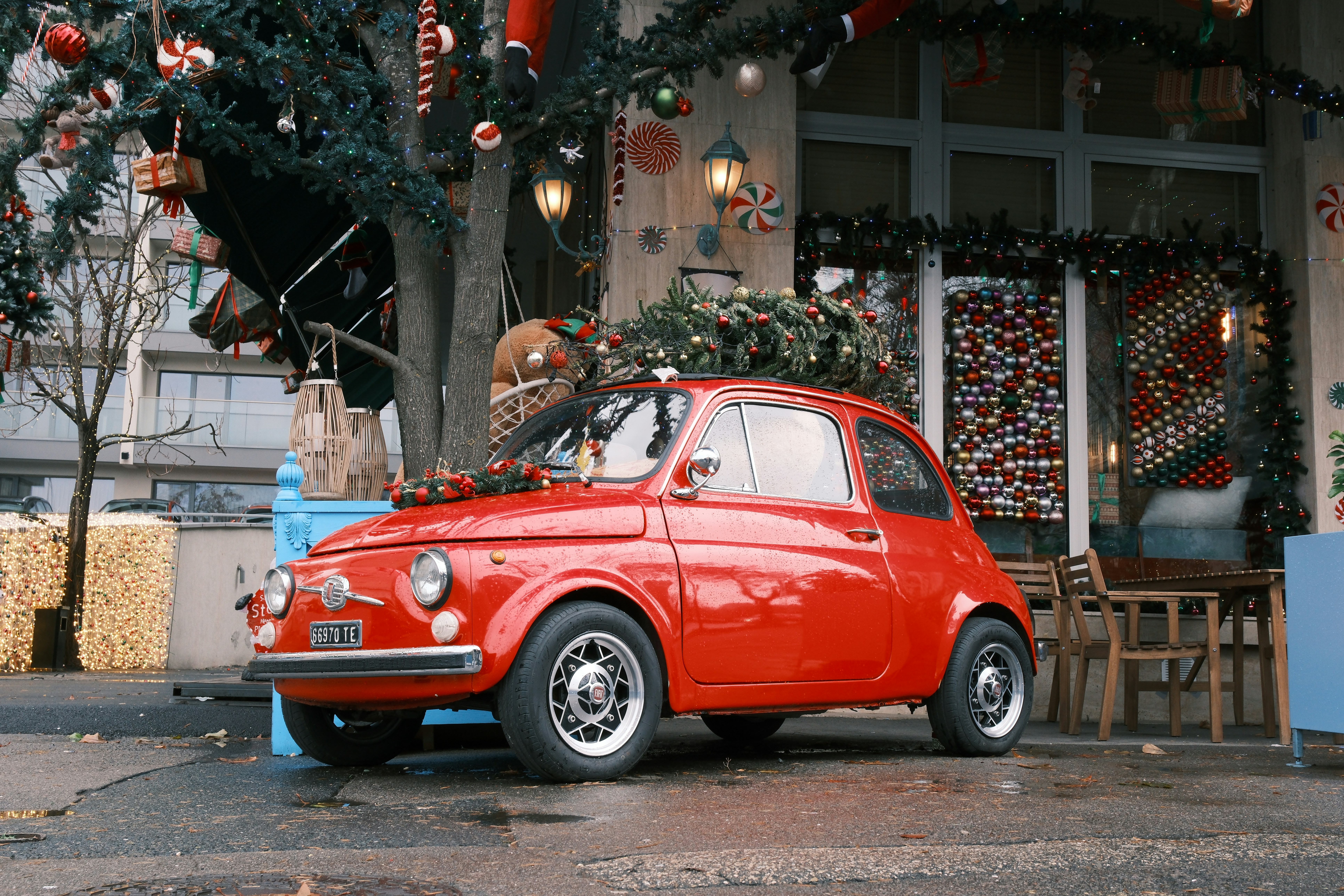 Red Classic on a Candy-Cane Courtyard