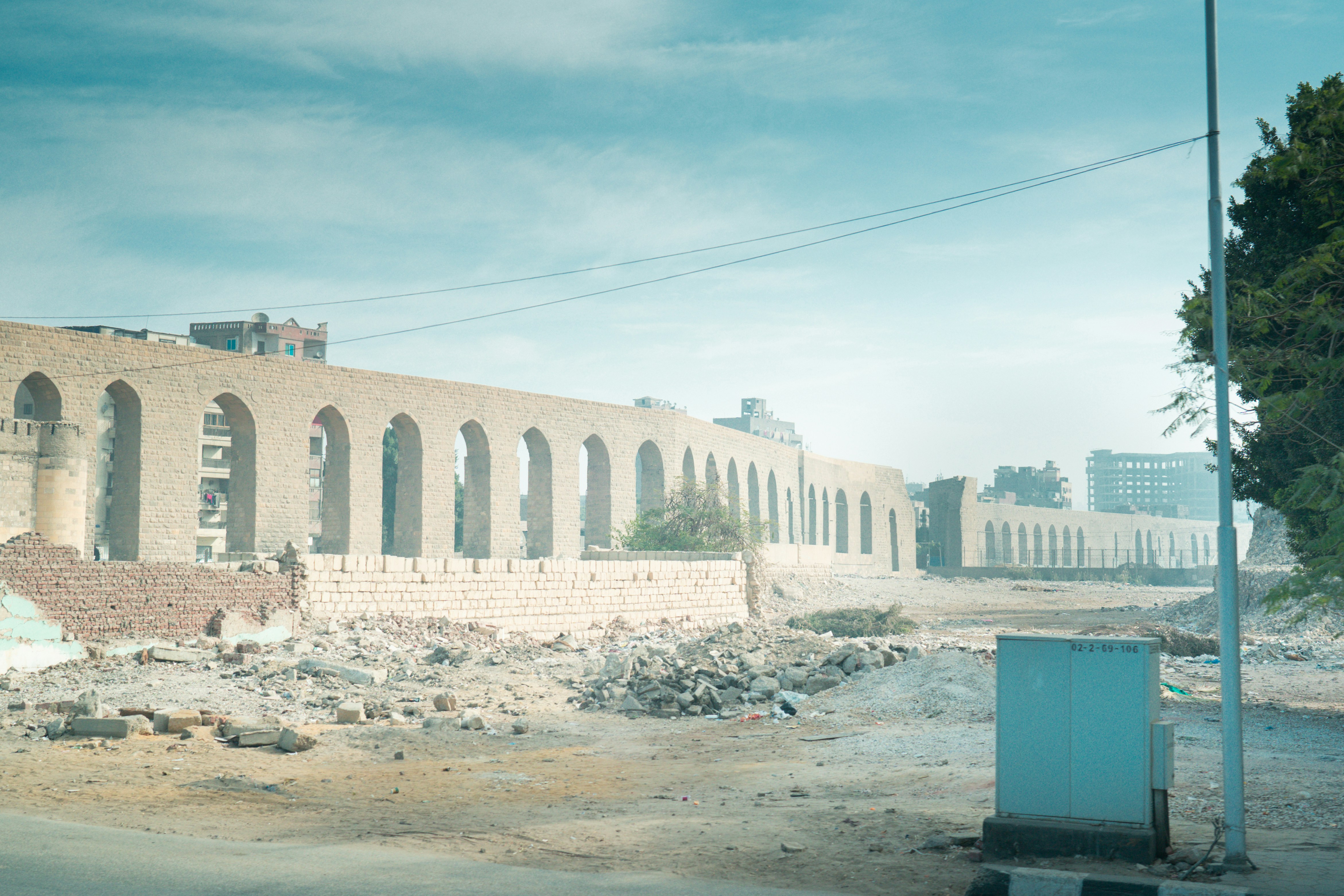 Ancient arches Echoing Along a Dry Riverbed