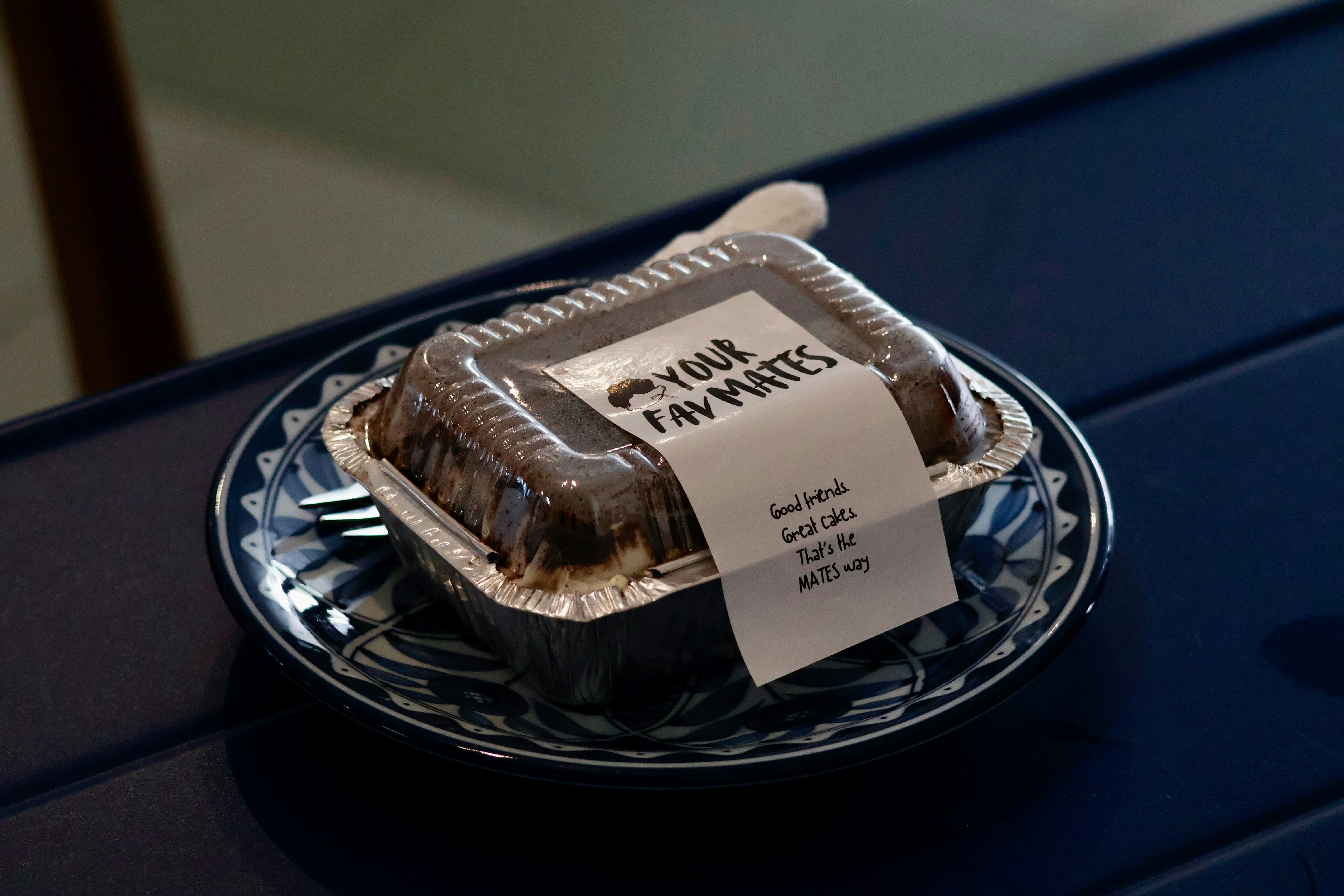 A Dessert Noir: Chocolate Tray on a Deep Blue Table