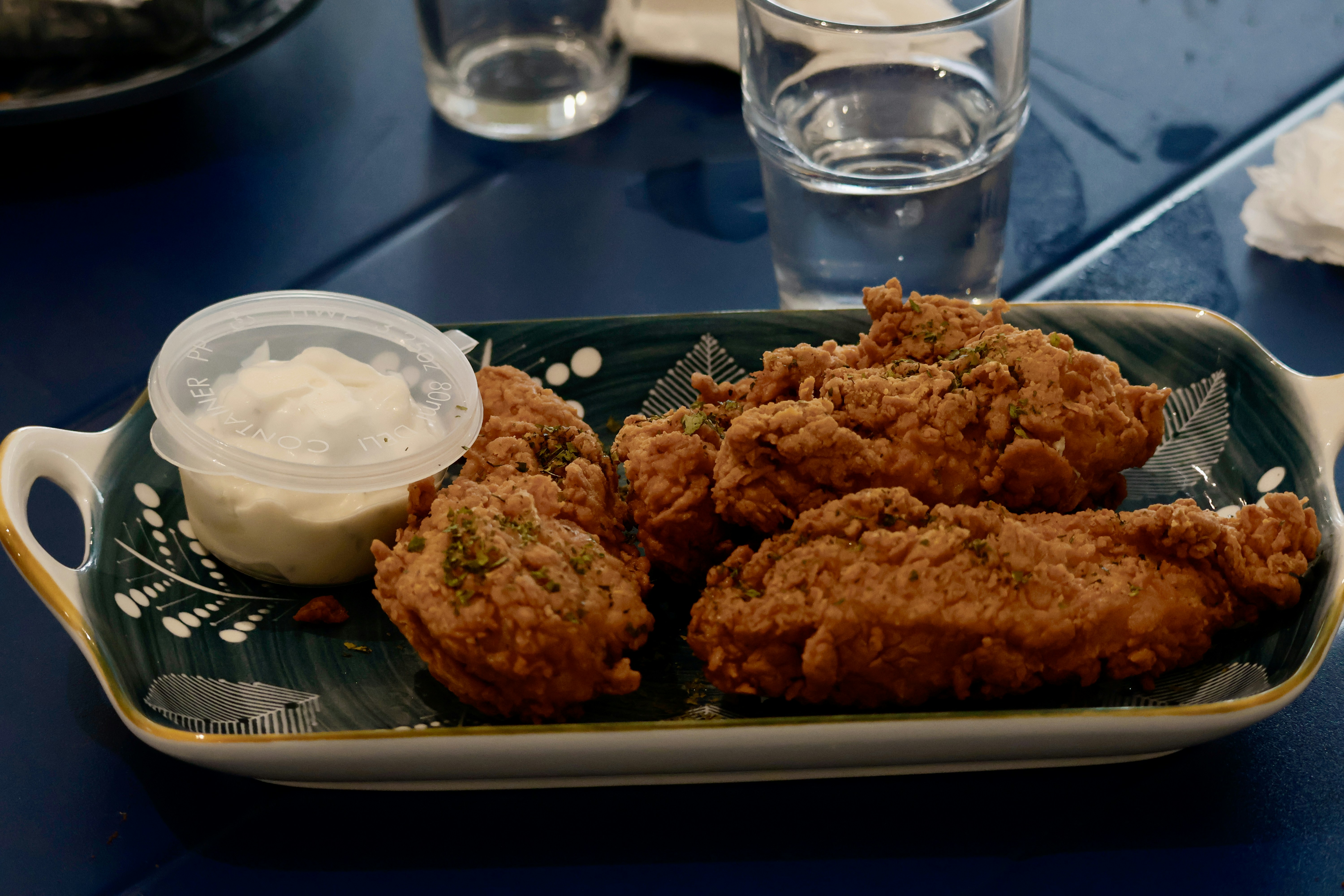Crispy Fried Chicken Ensemble with Dipping Dairy on a Decorative Tray