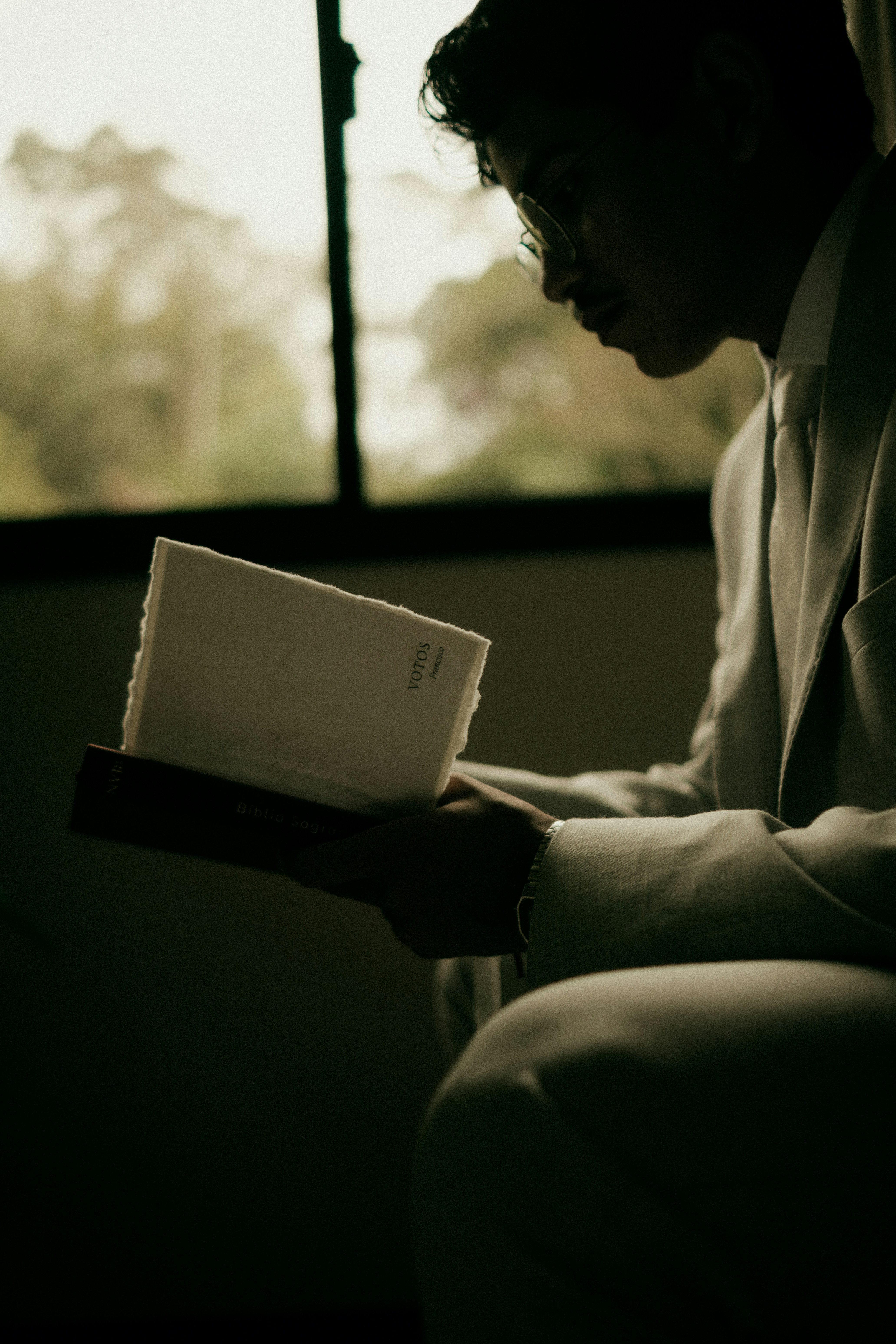 Quiet Reading Moment: A Gentleman with Letters in Soft Evening Light