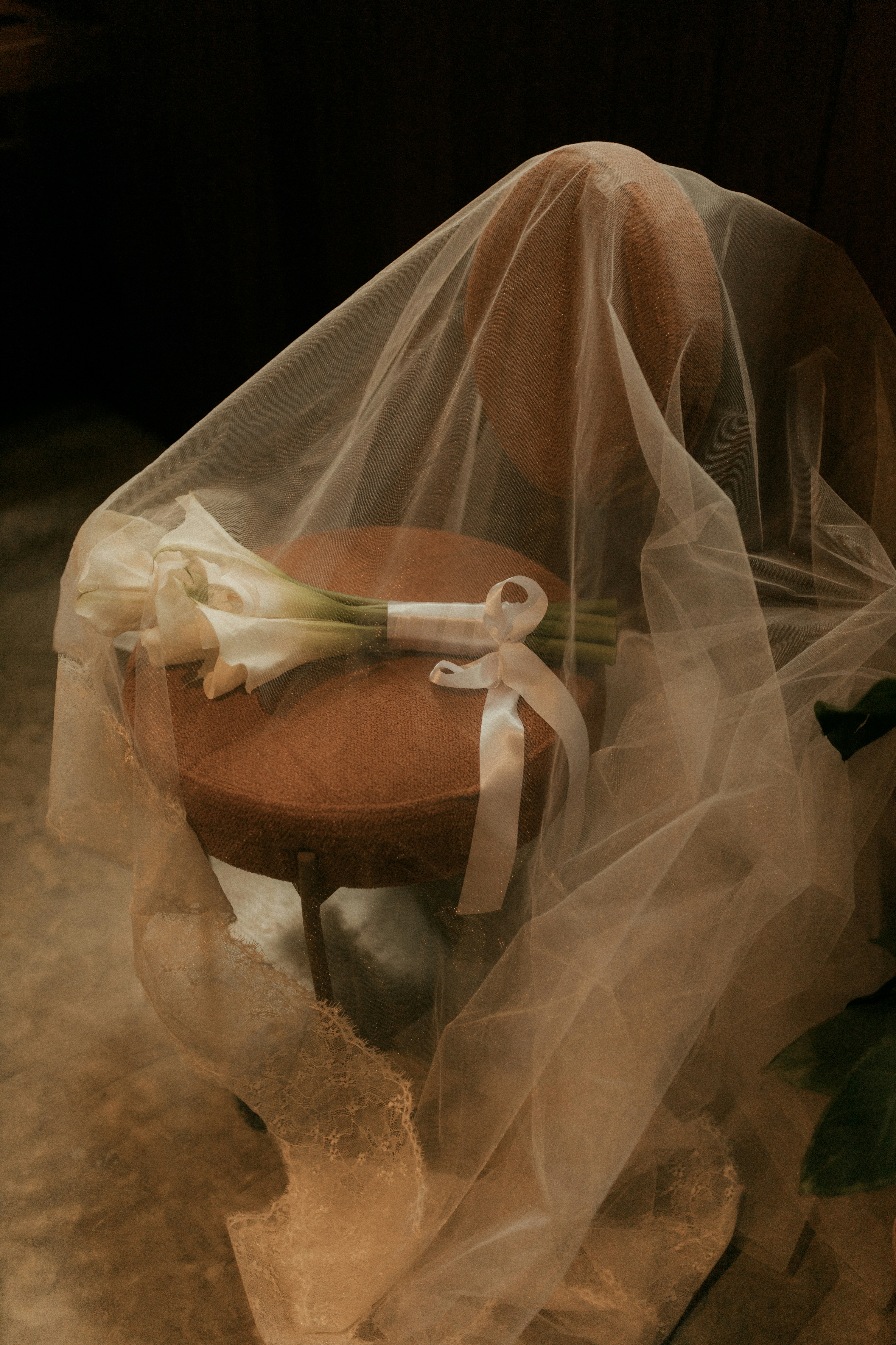 Veiled Ceremony: A Bride’s Bouquet on Velvet Silence