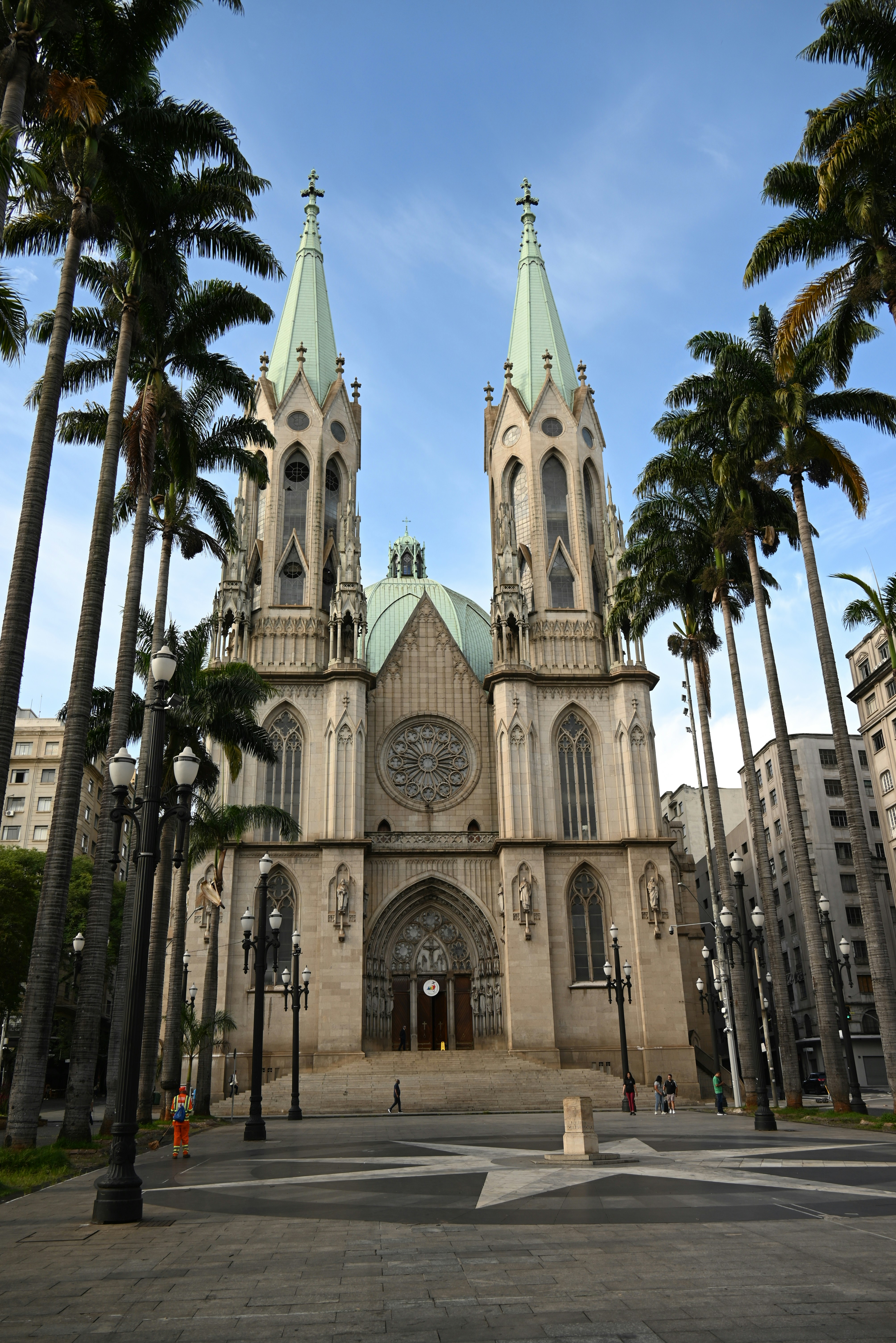 Twin Spires and Palm-Lined Facade