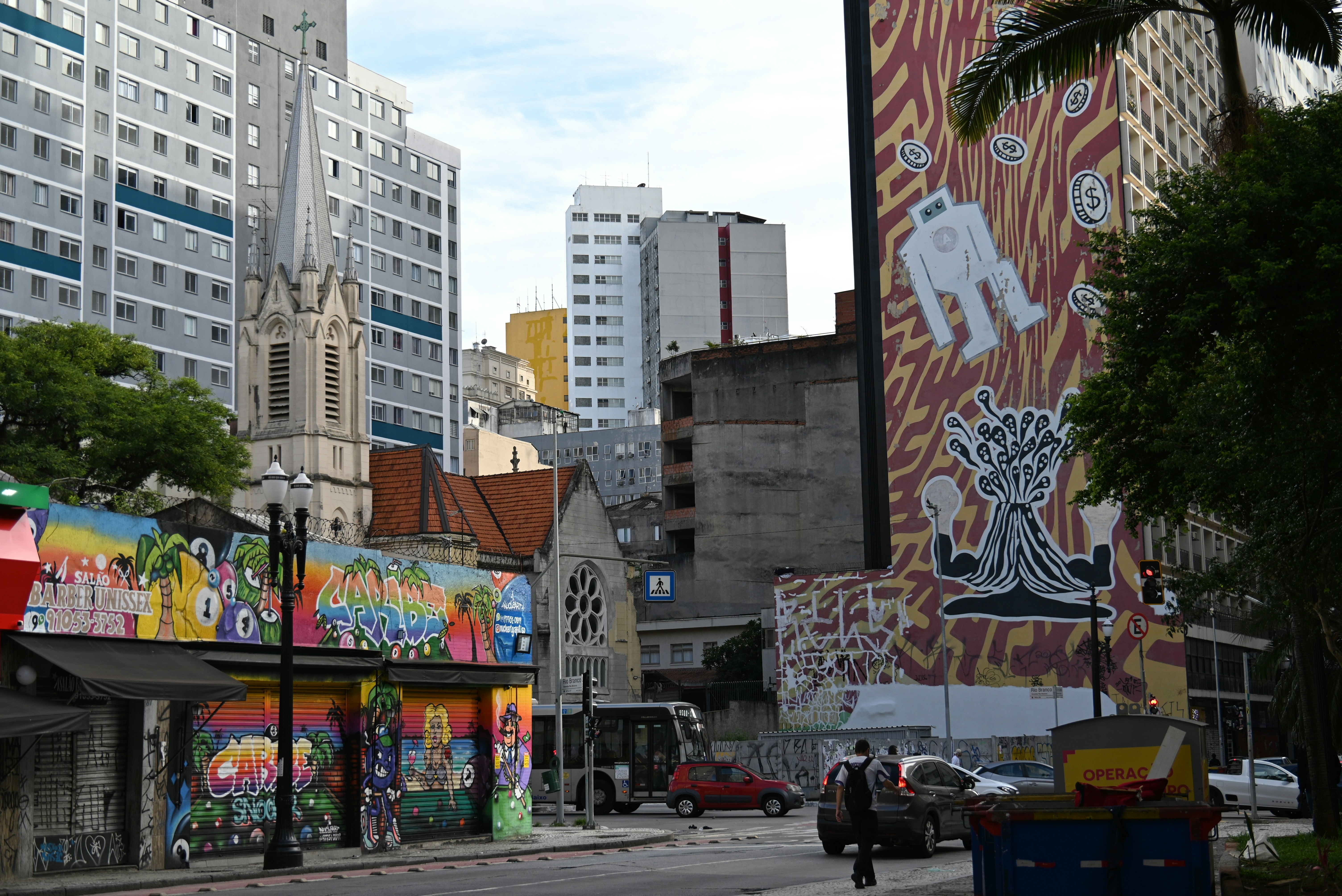 Urban Mosaic: Graffiti Facade Meets Skyline Cathedral