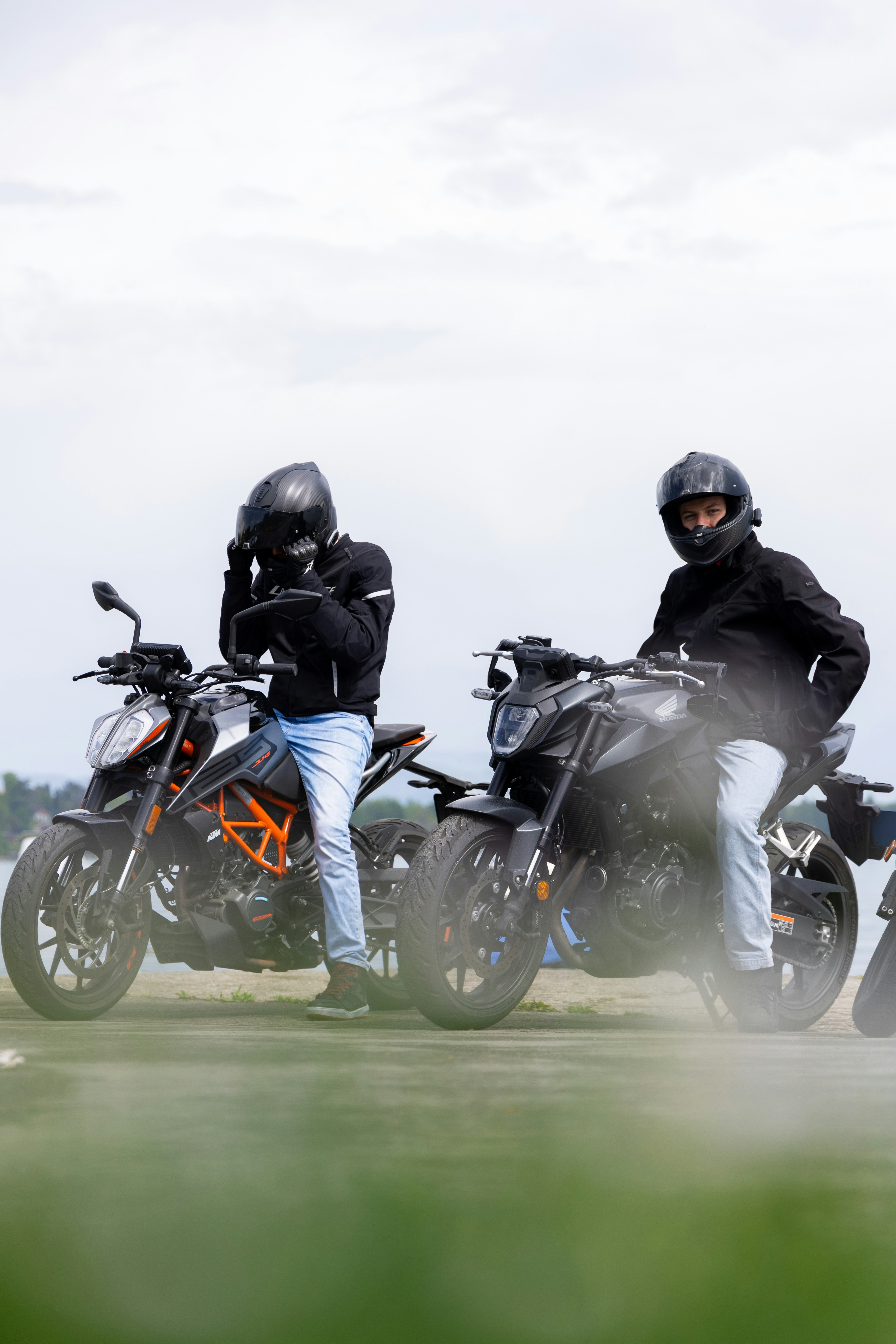 Dual Riders on Matte Black Machines, Dawn-tinged Horizon