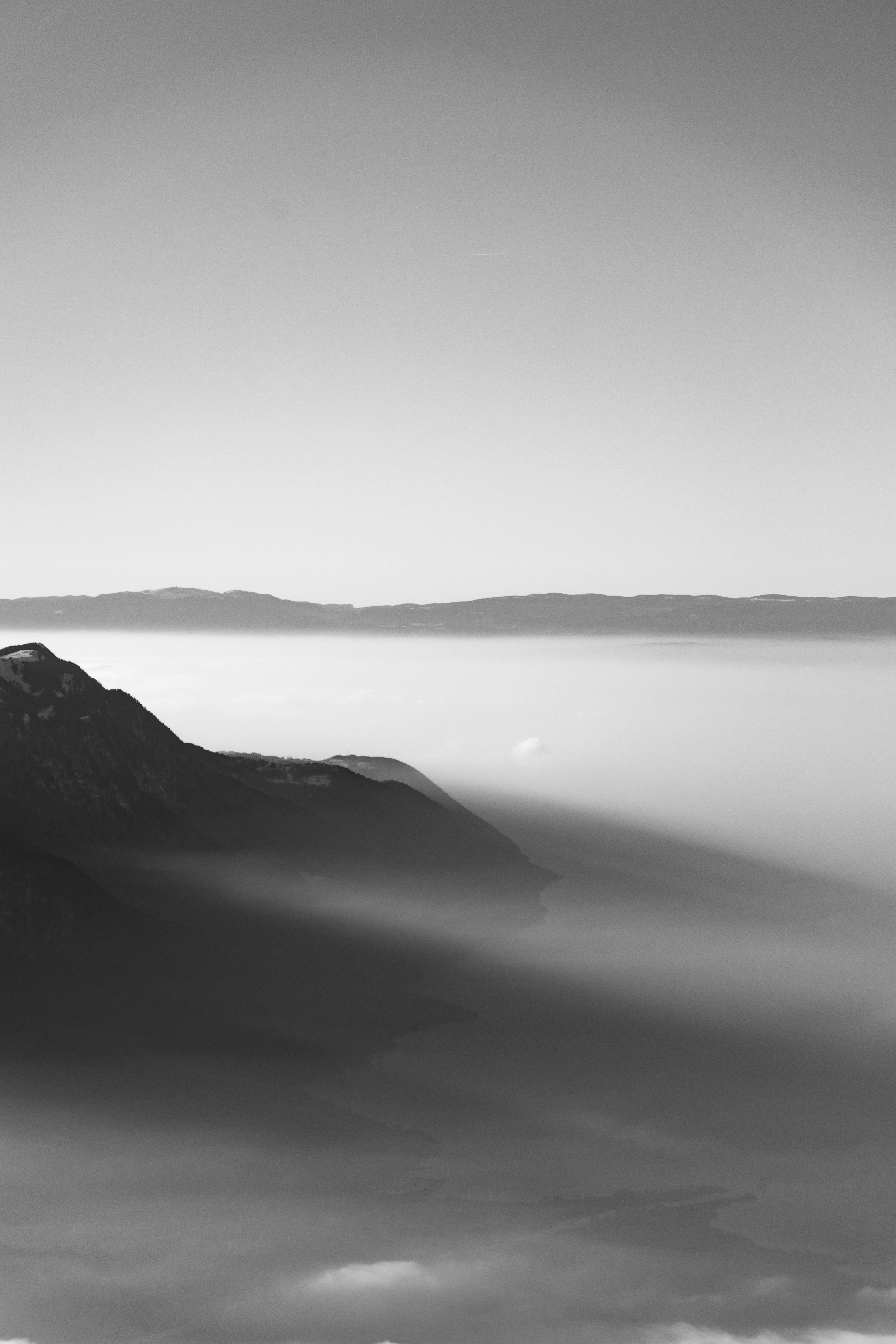 Mist-Swept Cliffs Above a Sleeping Sea