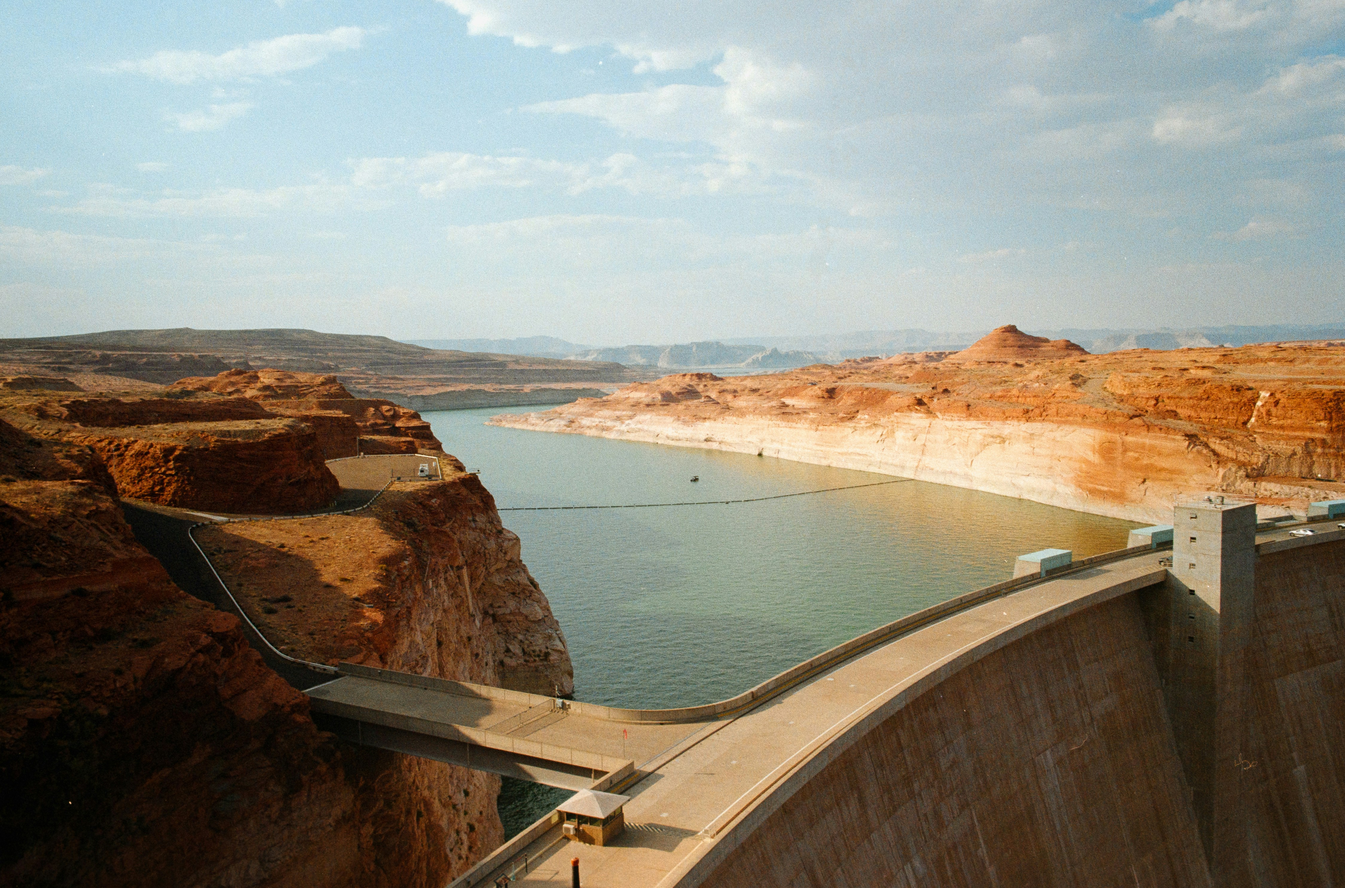 Waterway along the canyon dam: sculpted curves and desert light