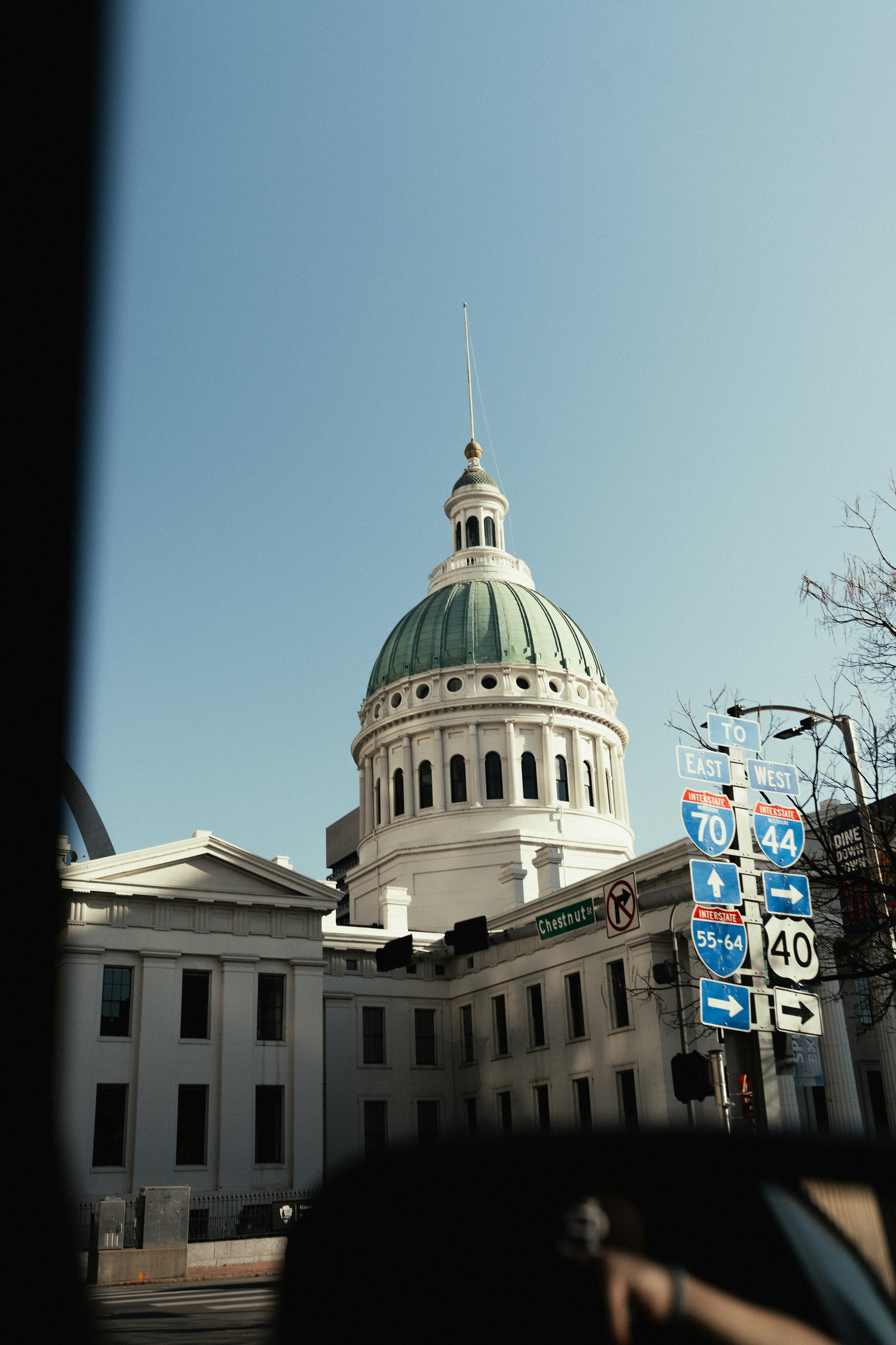 Capitol Dome Amid City Signs