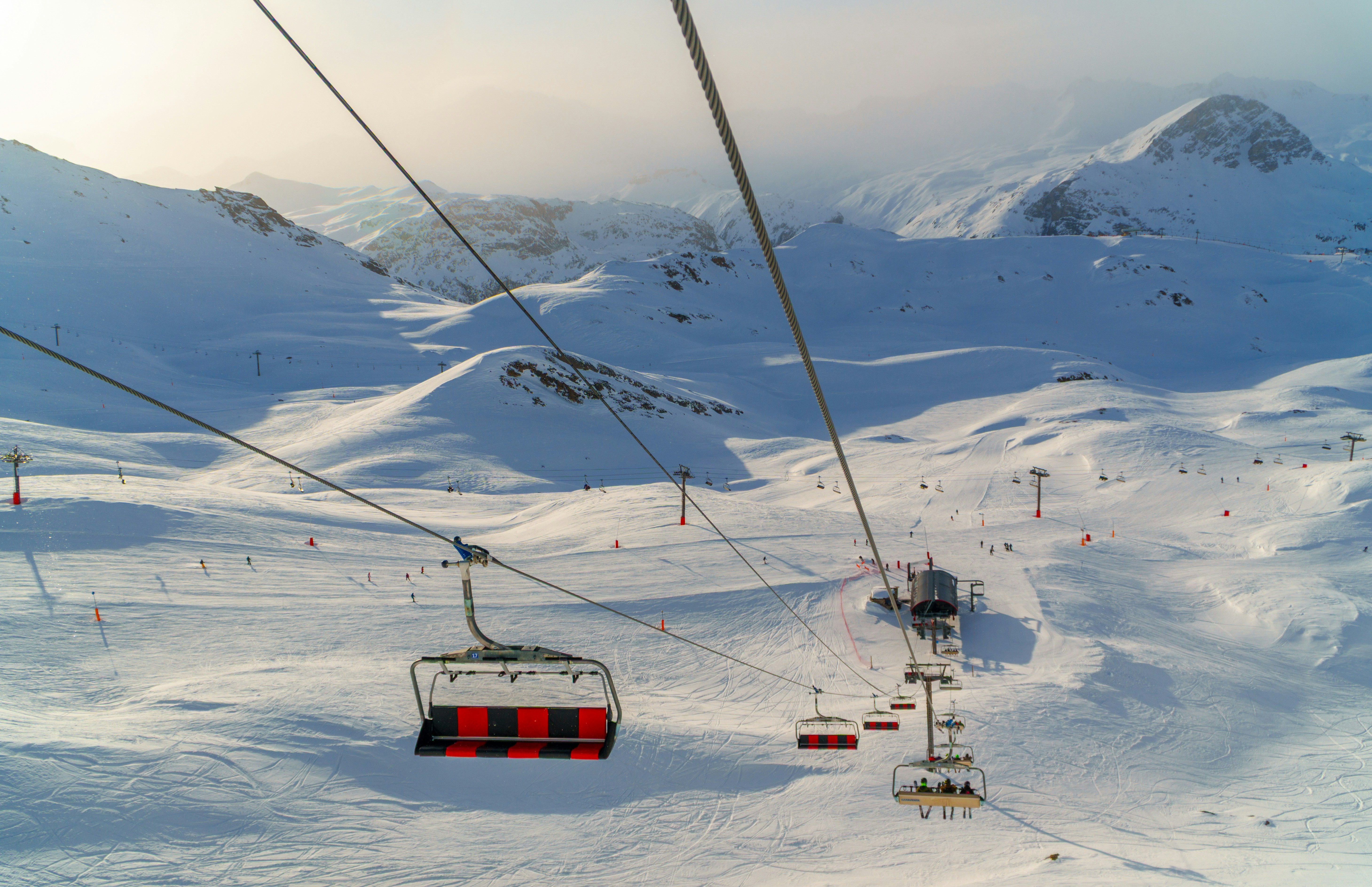 Lift Lines Over a Snow-Cwept Summit
