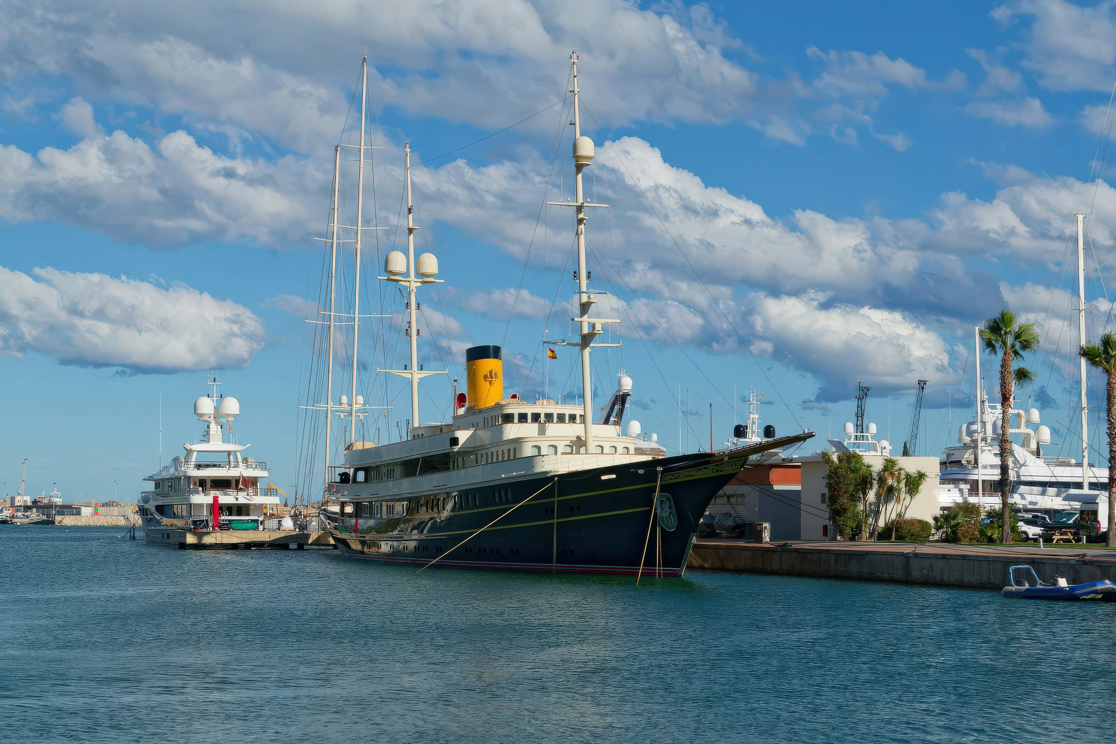 Heritage of the Harbour: A Classic Yacht Anchored in Calm Waters
