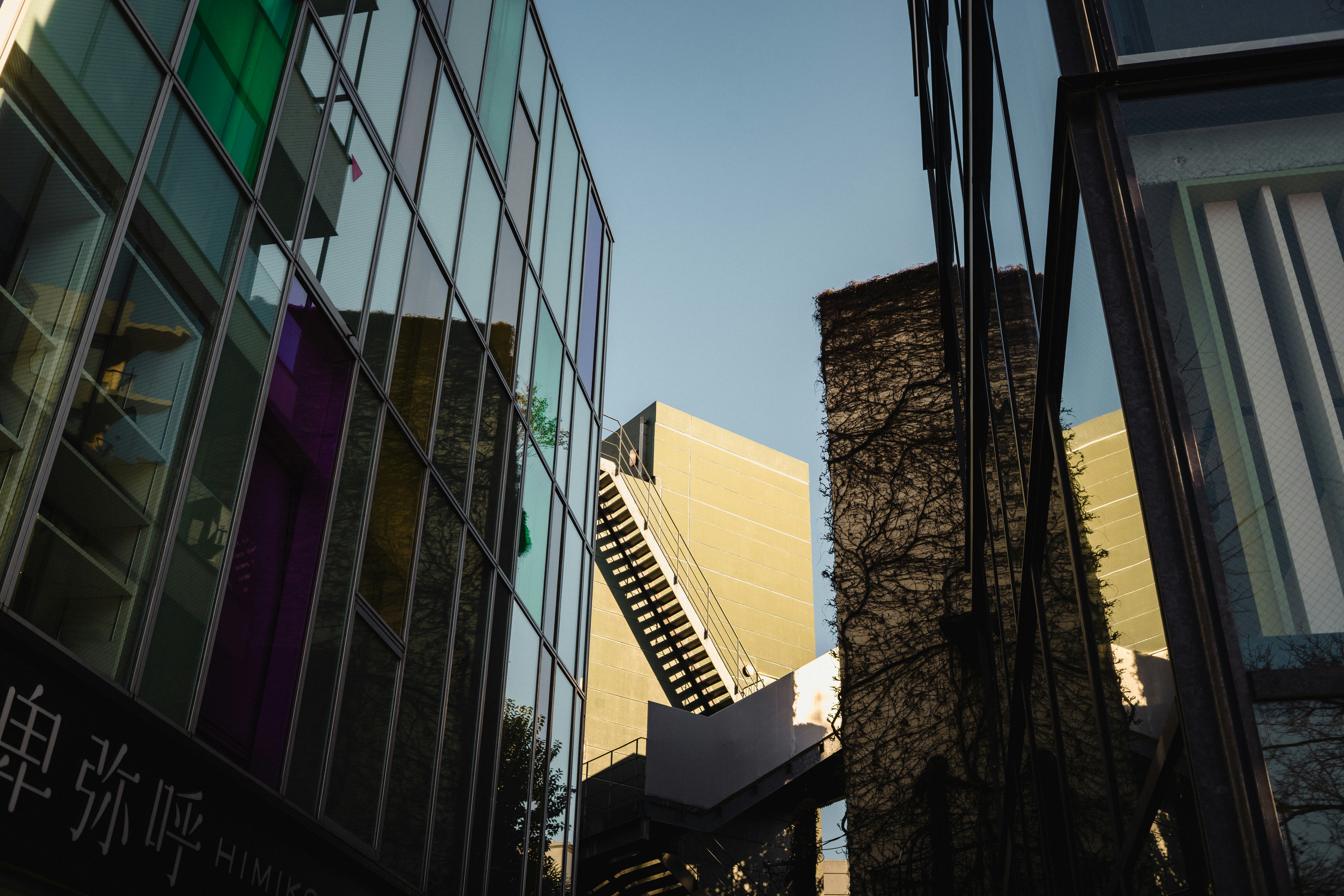 Reflections and steel: a canyon of glass and brick