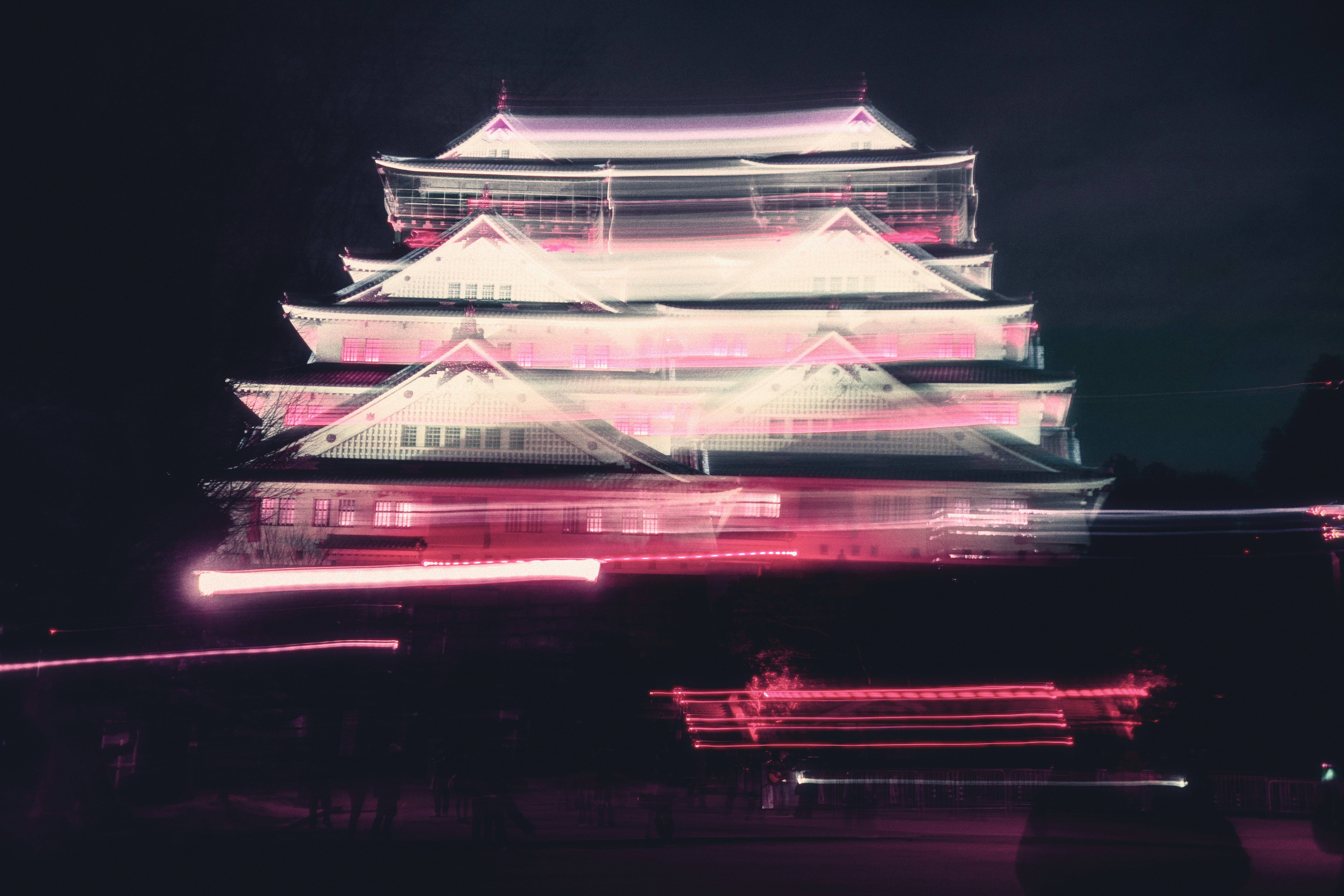 Neon Streaks over a Lantern-lit Pagoda