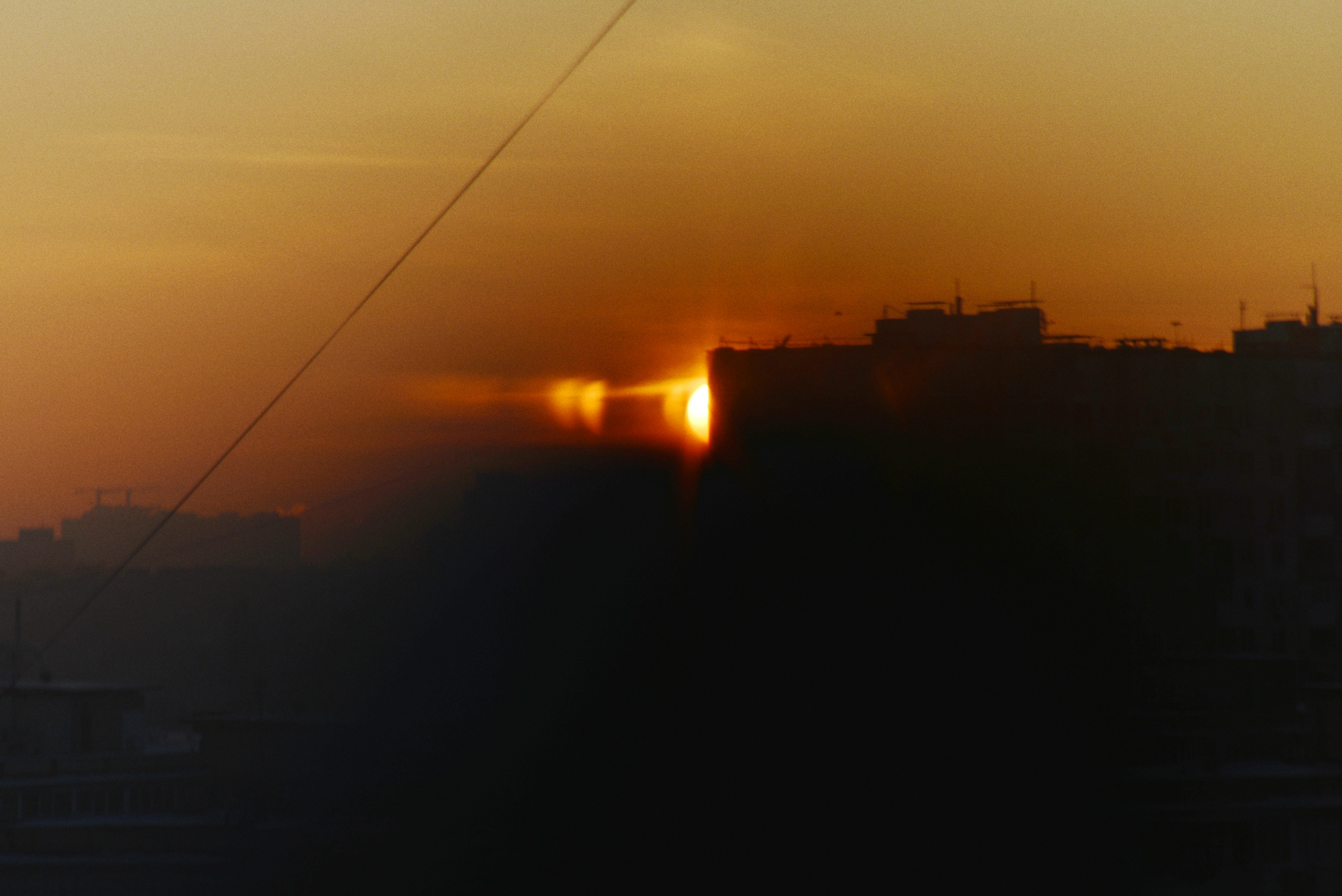 Sun Kissed Skyline: Evening Light Clinging to the Cliff