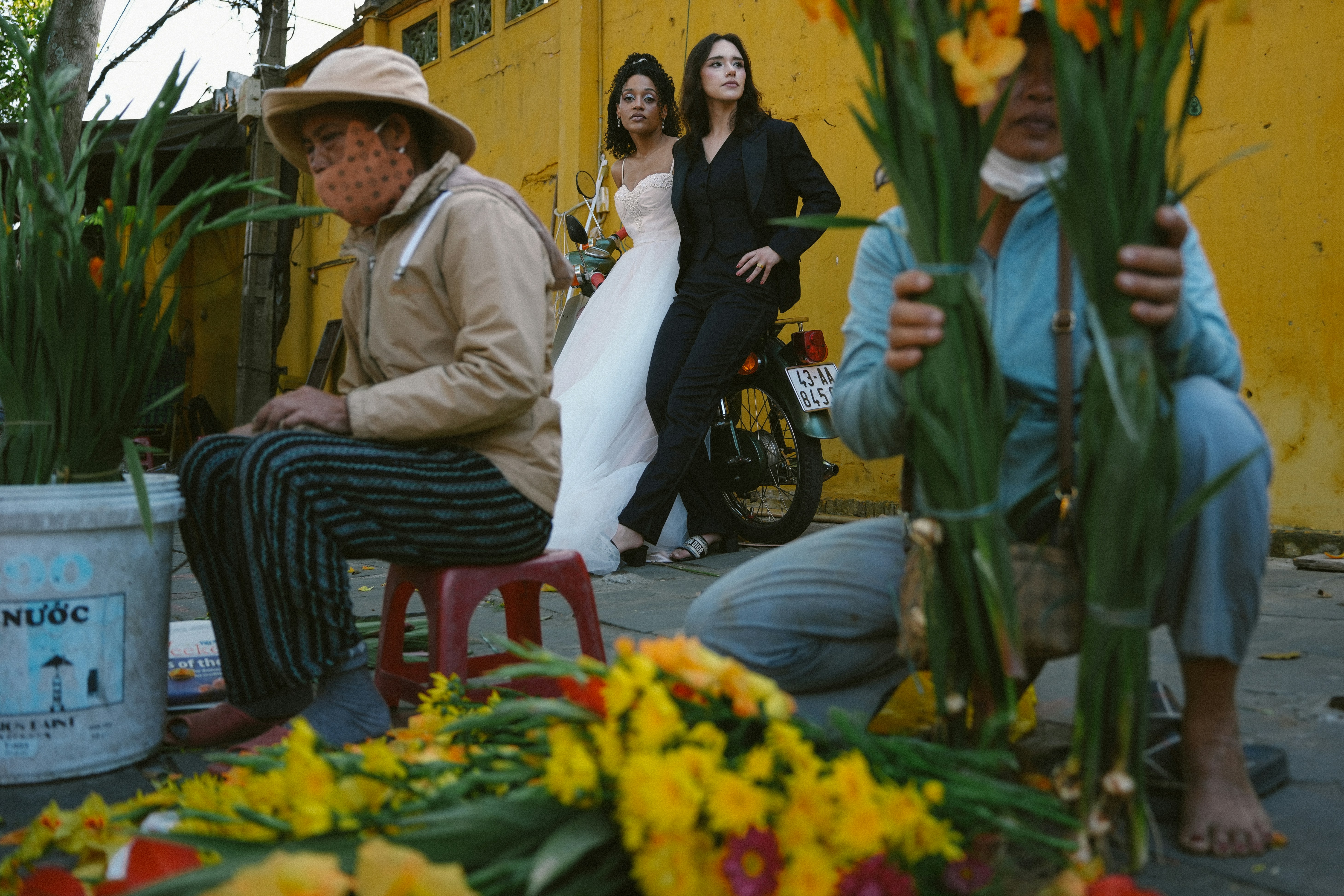 Vivid Street Portrait Amid Floral Market Backdrop