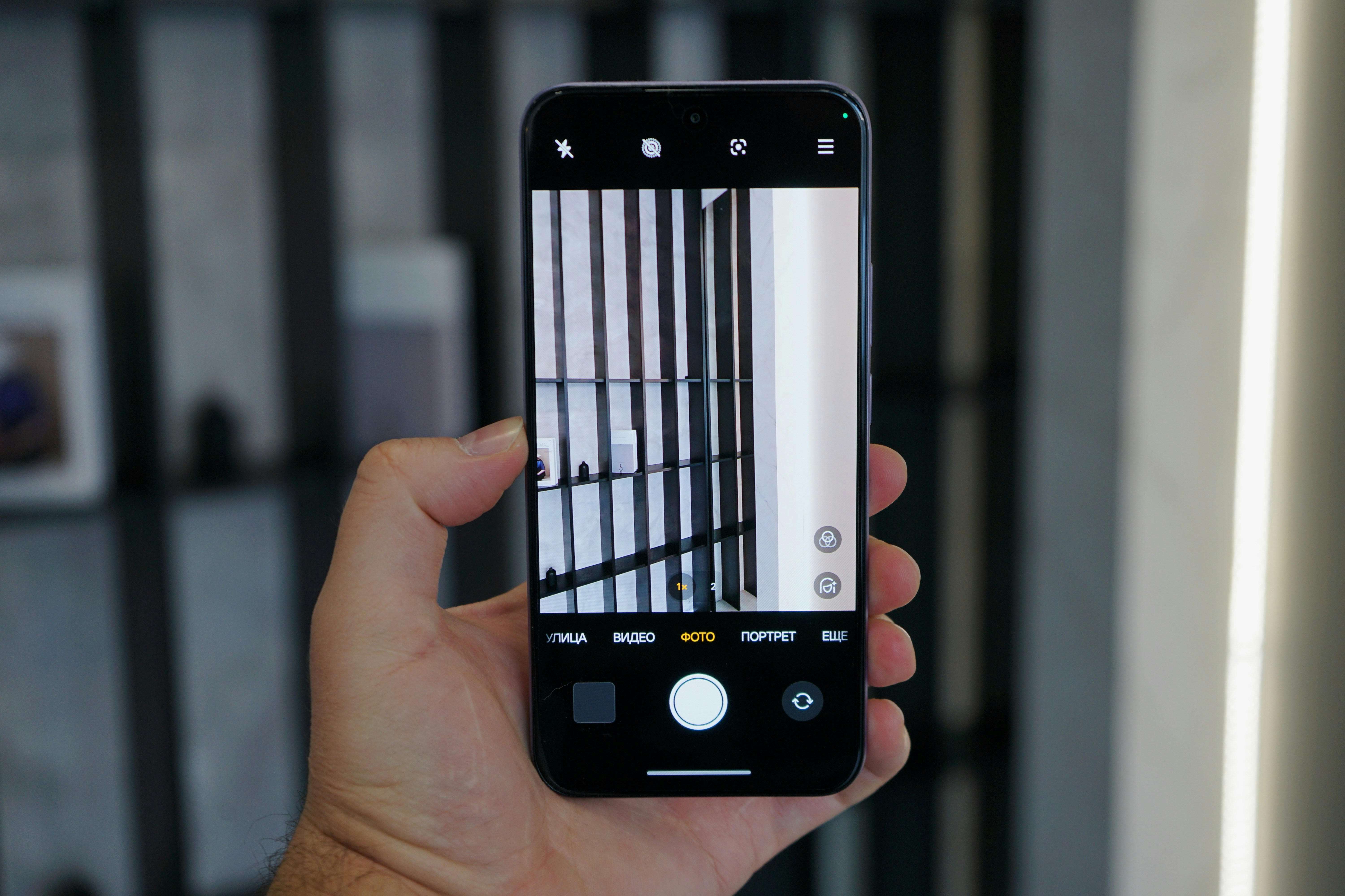 Gripped in Focus: Framed in a Handheld Moment