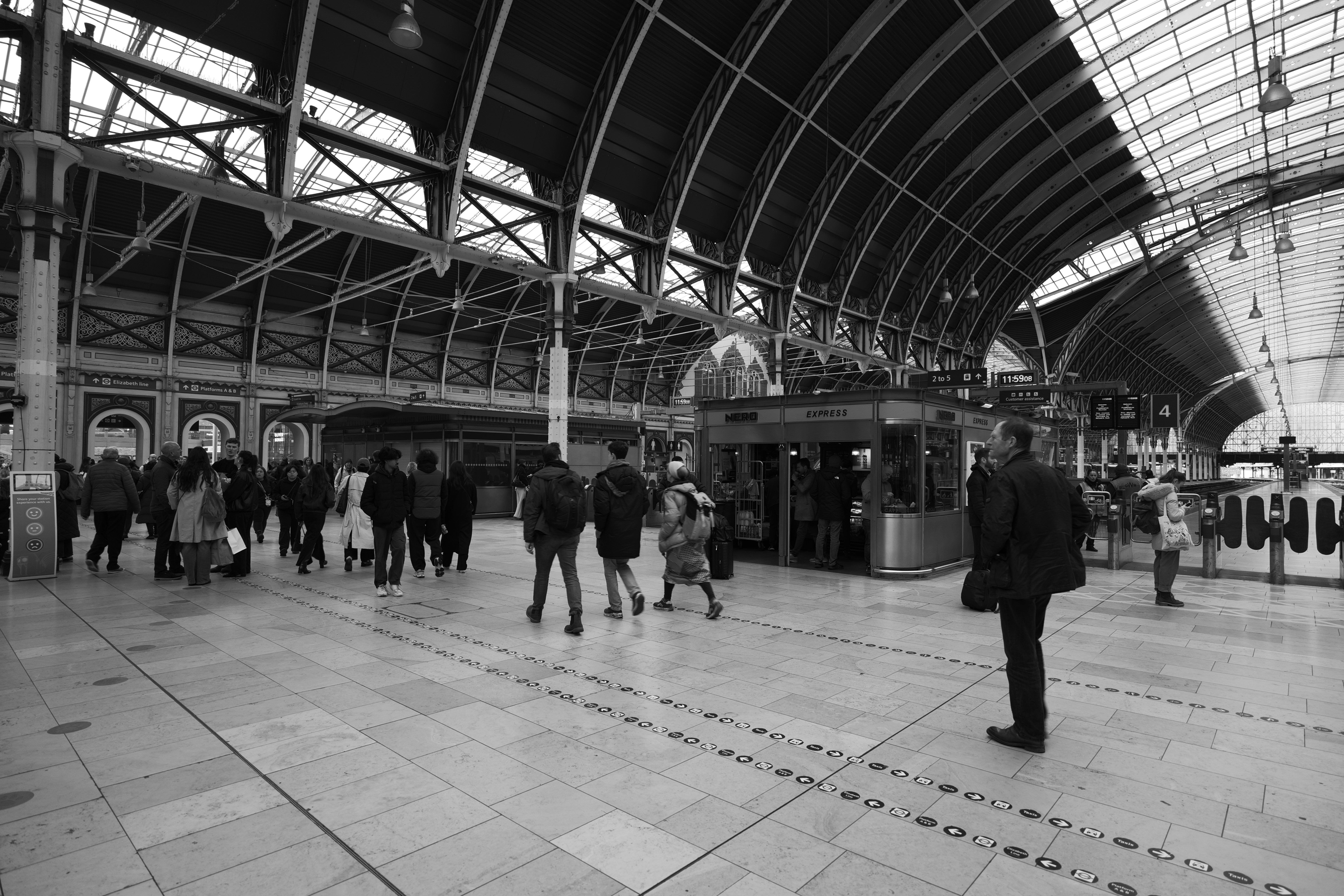 Station Convergence: People, Trains, and Steel Arches