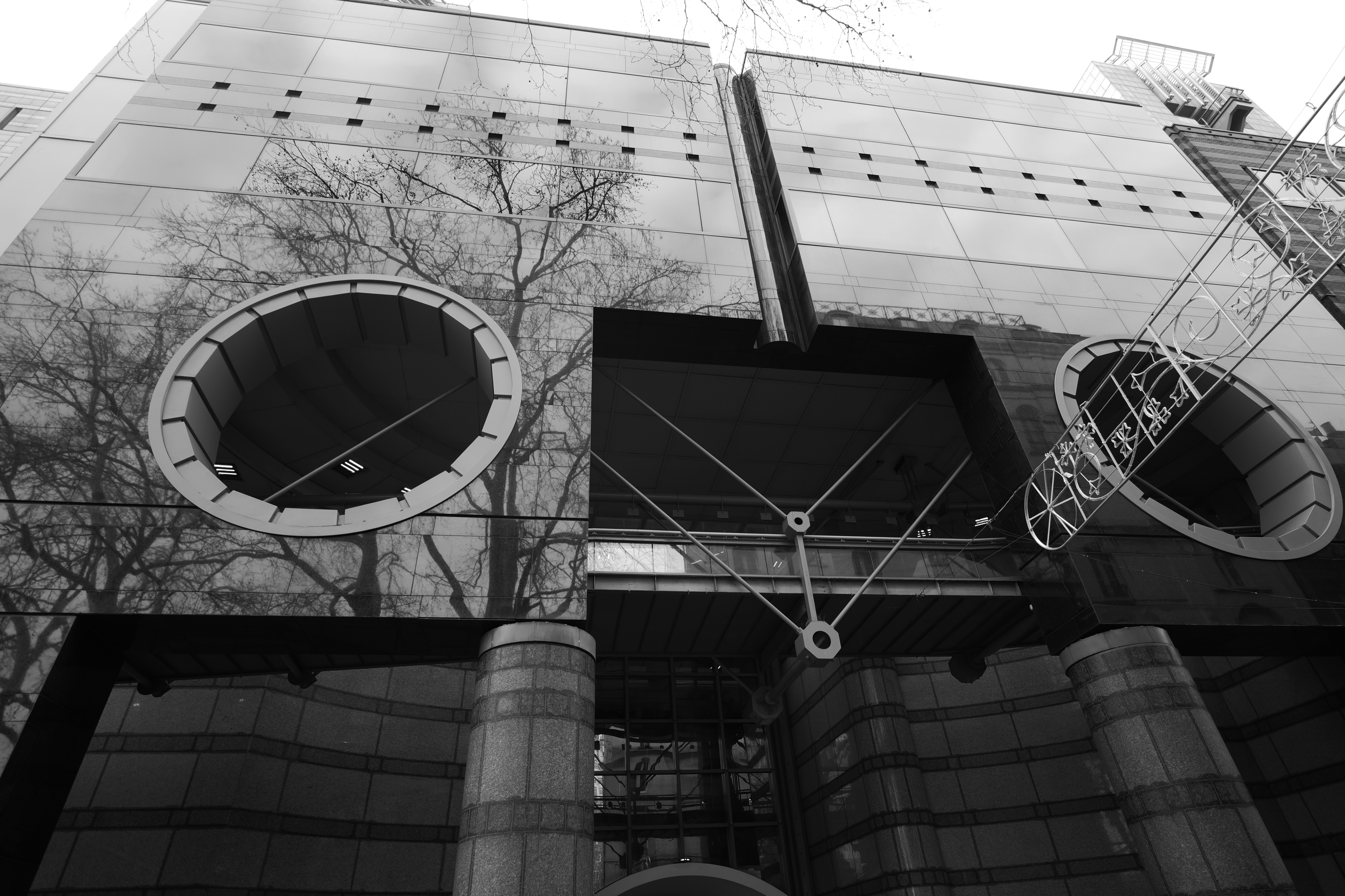 Symmetry in Steel: Circular Orbs Framing a Modern Facade