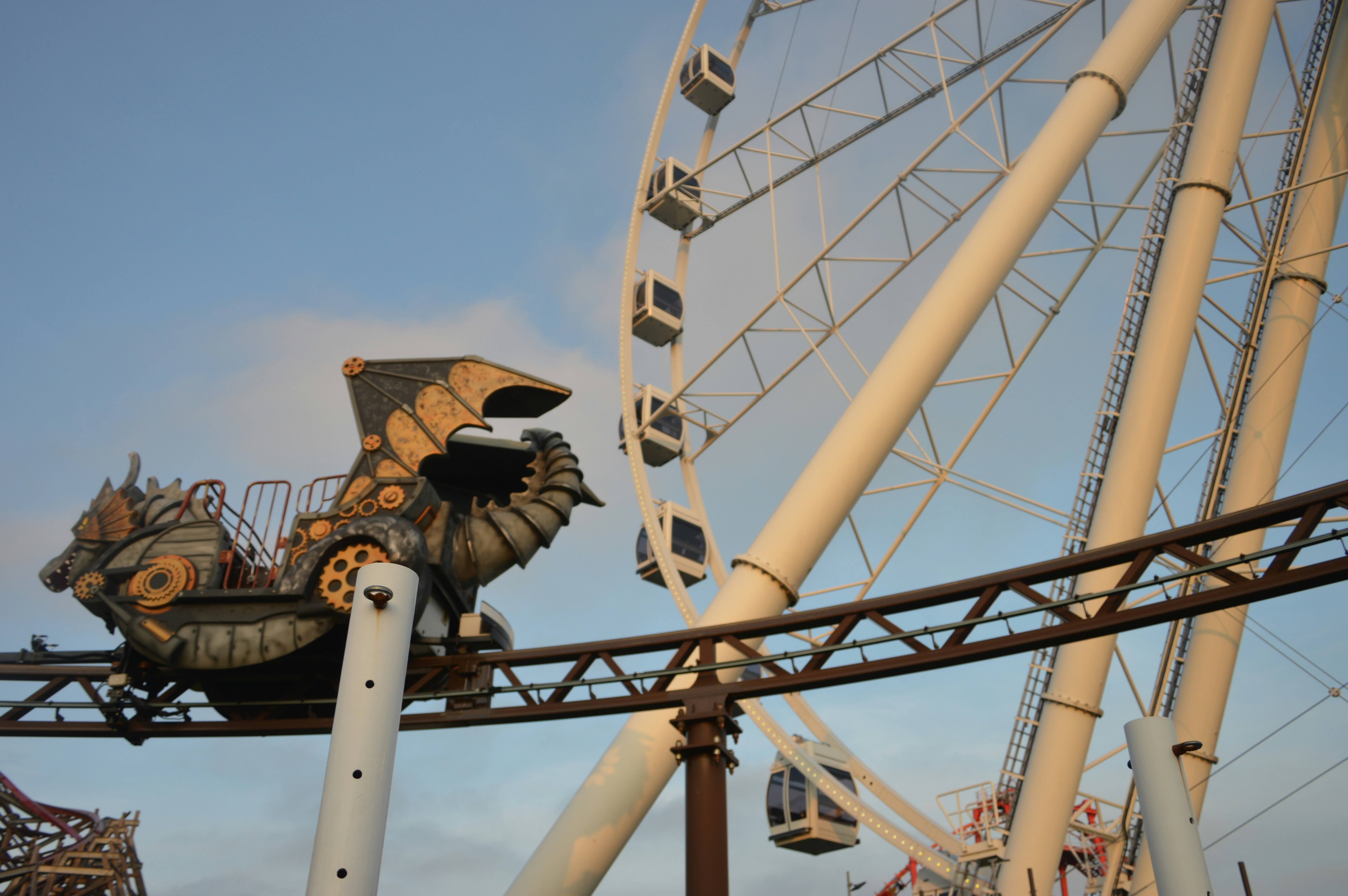 Carousel Dragon on the Rails Beneath the Ferris Wheel