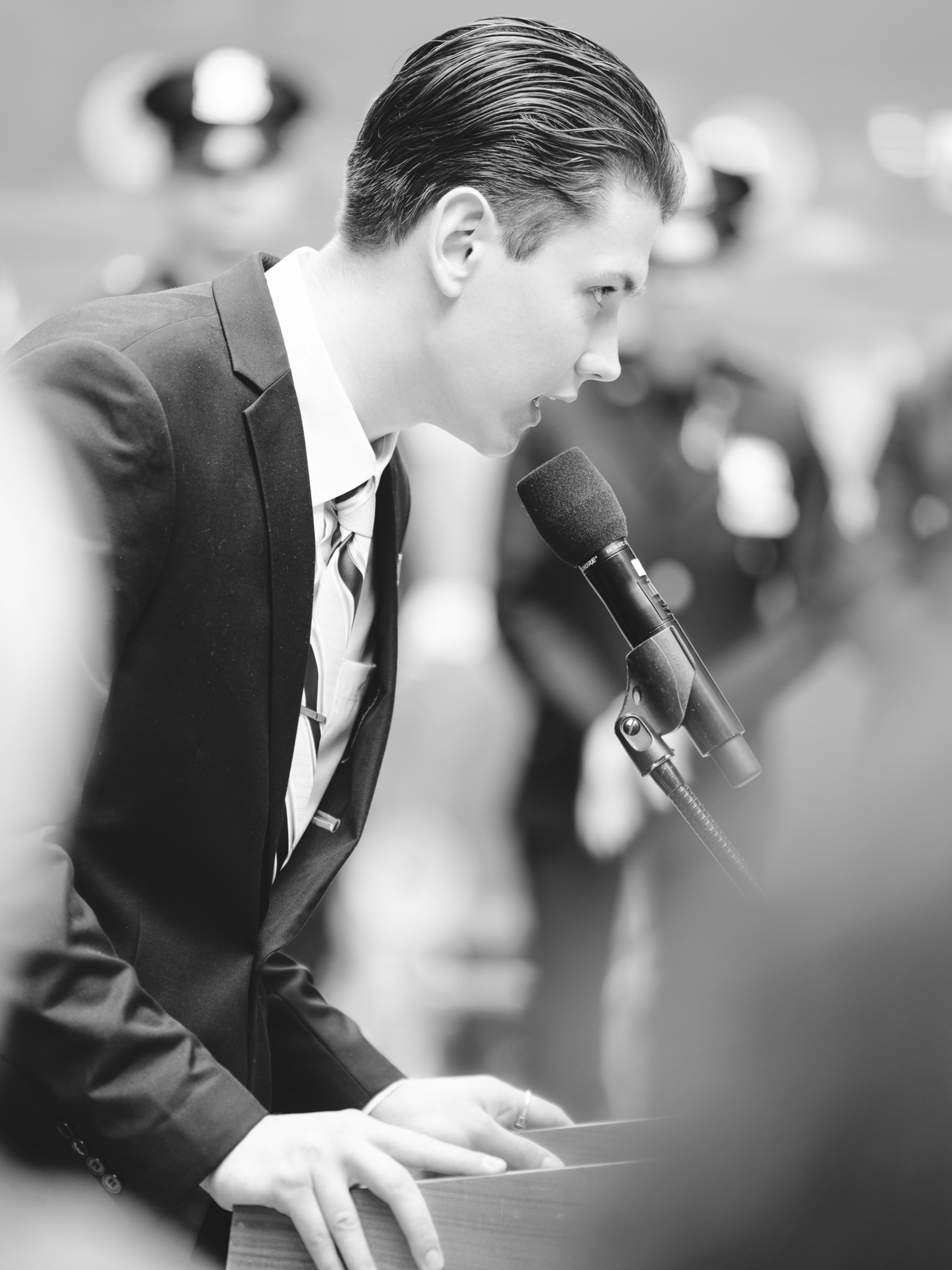 In the Spotlight: A Singer at the Microphone in Focus