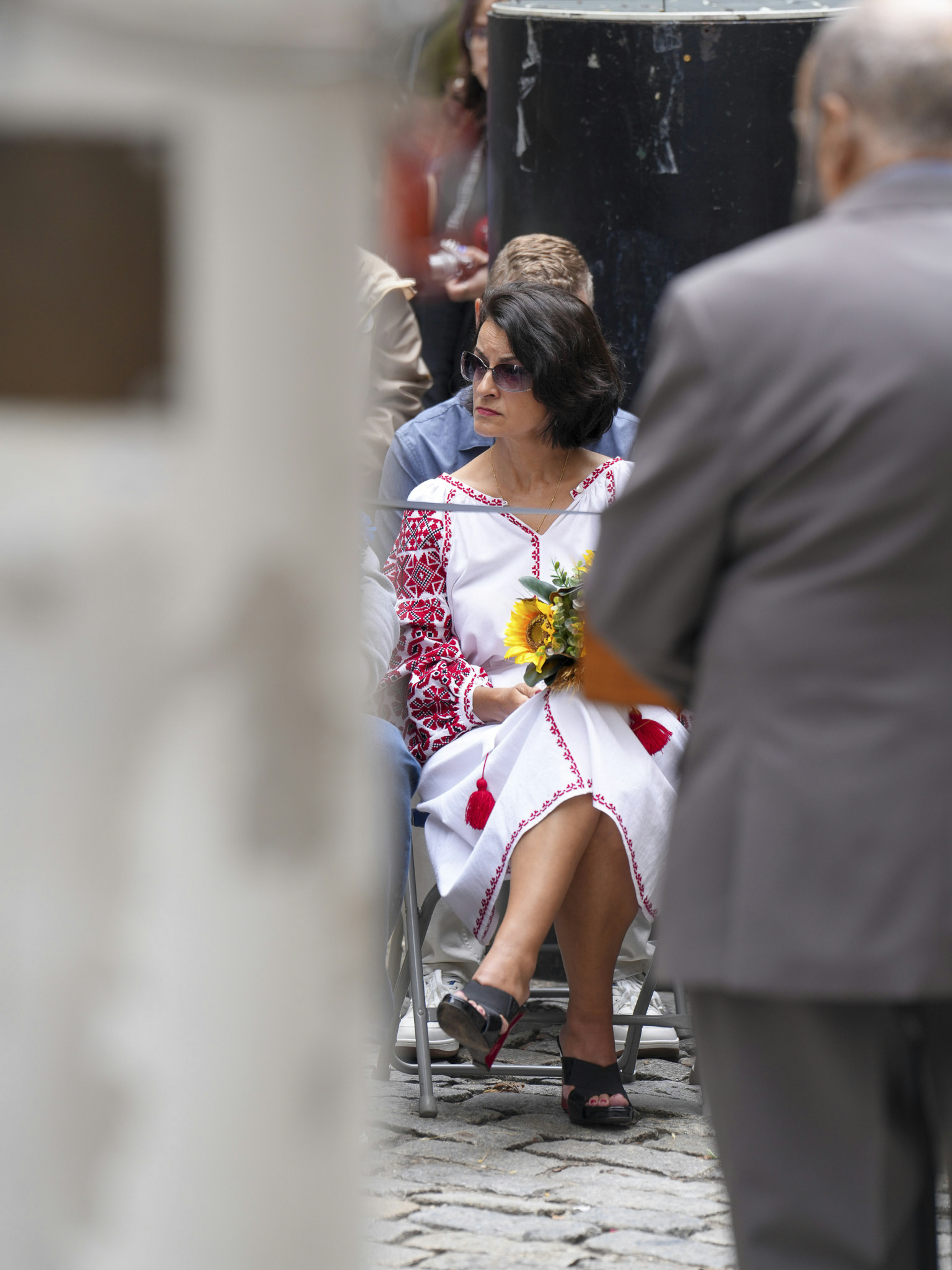 A Quiet Moment in a Sunflower Dress