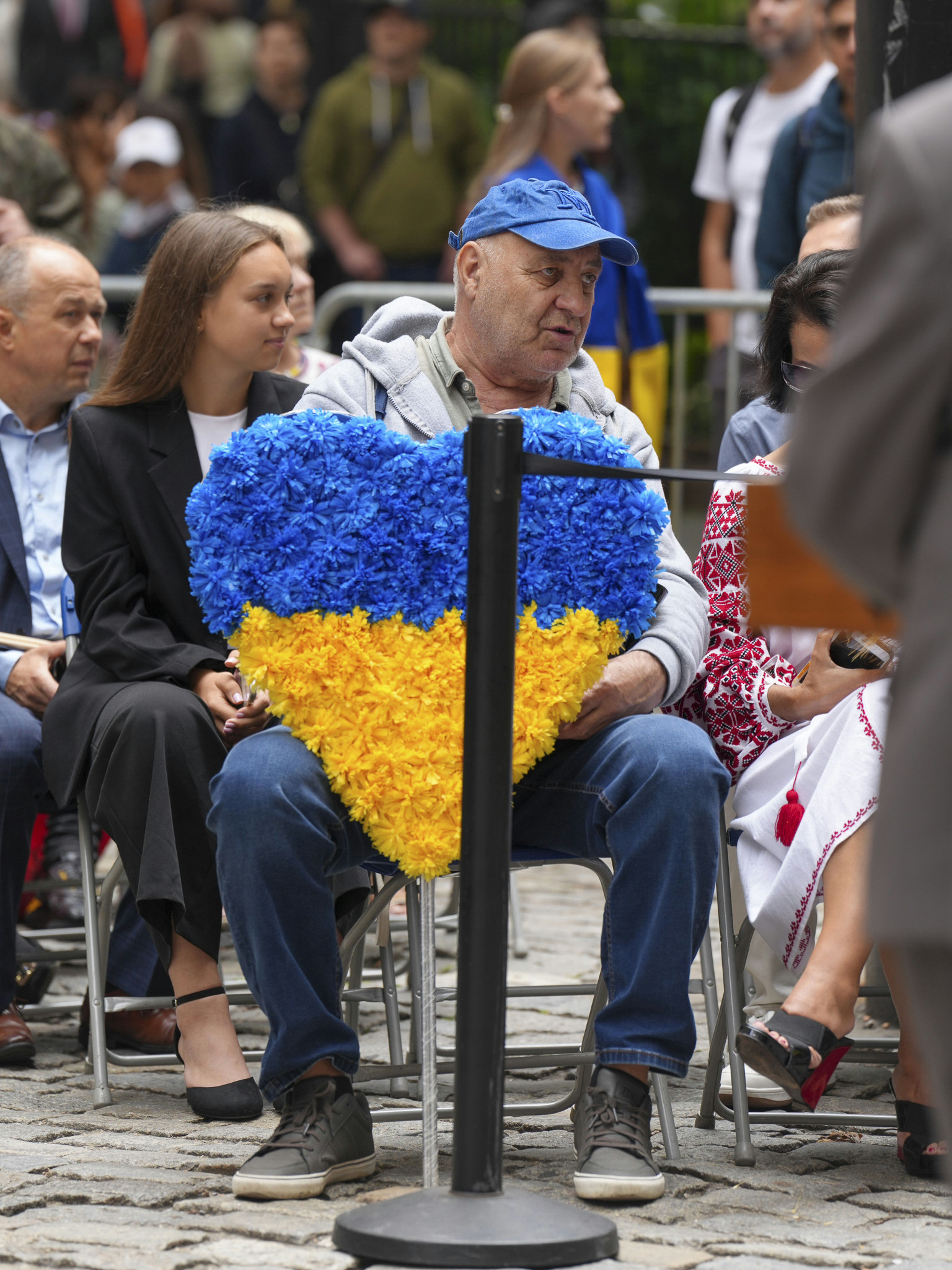 Blue and Yellow Heart: A Moment of Quiet Regard at the Rally