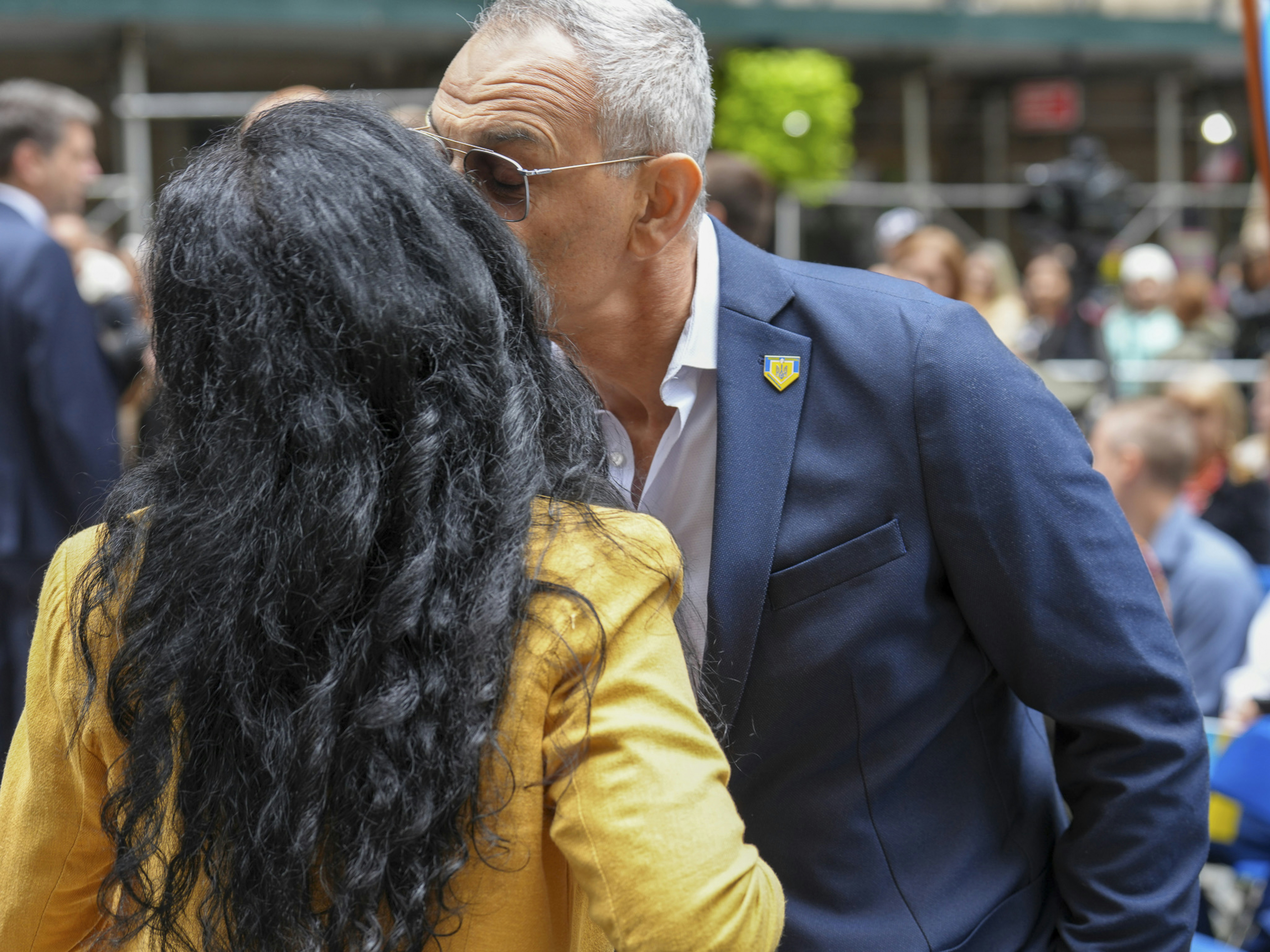 Close-Kissed Exchange at a Gala: A Moment of Veiled Intimacy