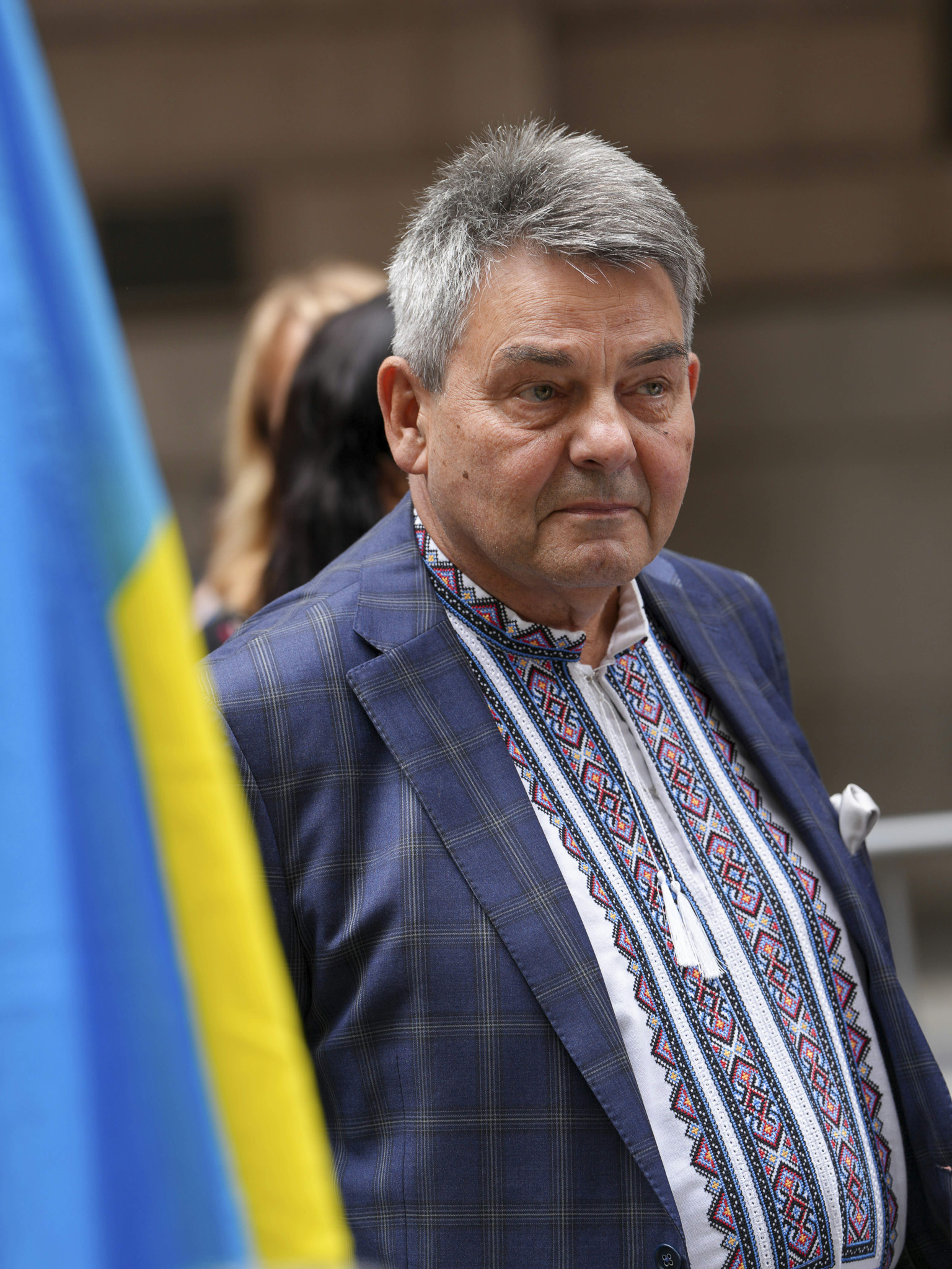 Portrait of a dignified Ukrainian official in traditional embroidery