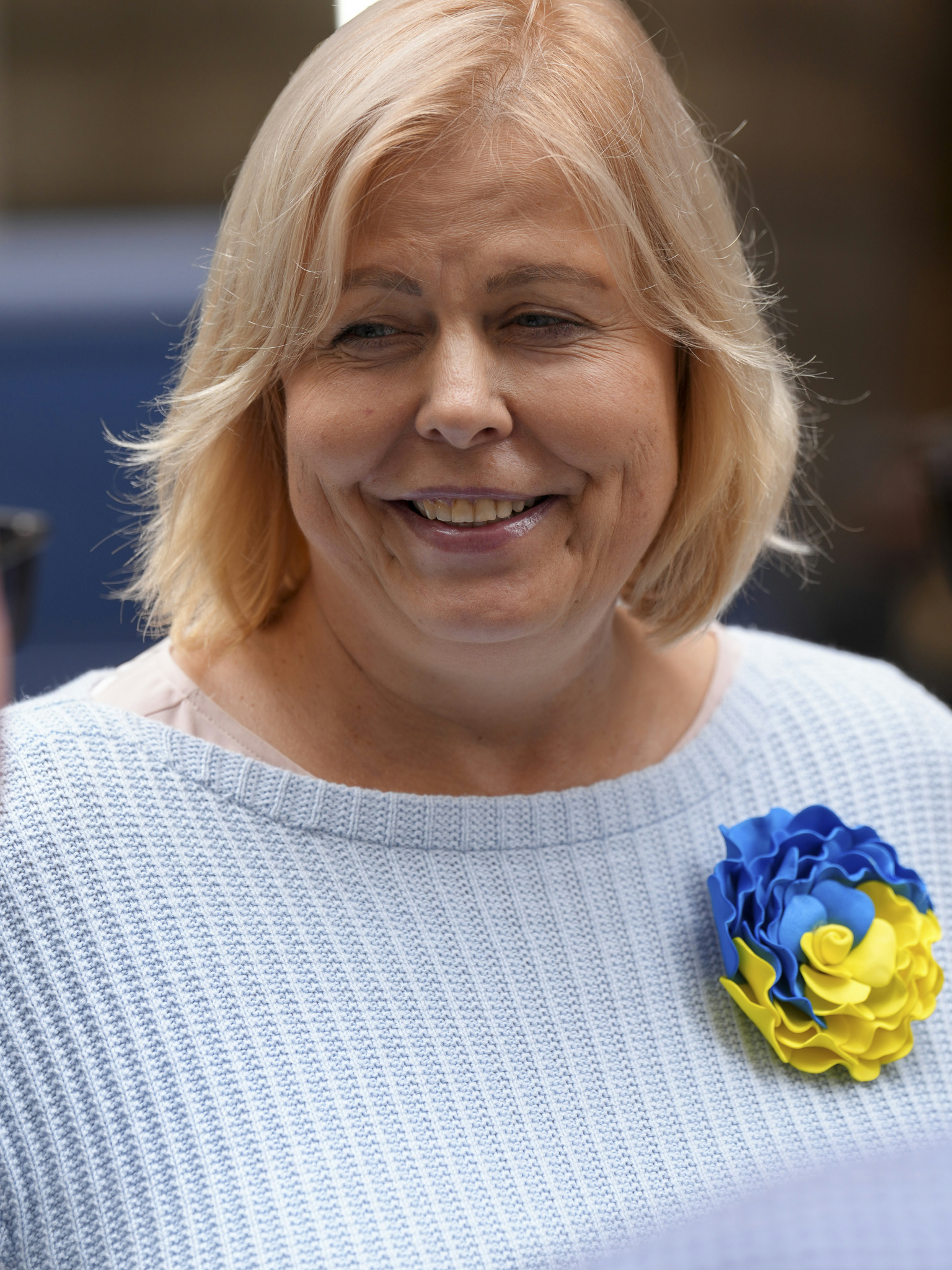 Warm Smile, Bright Ribbon: Portrait of Confidence