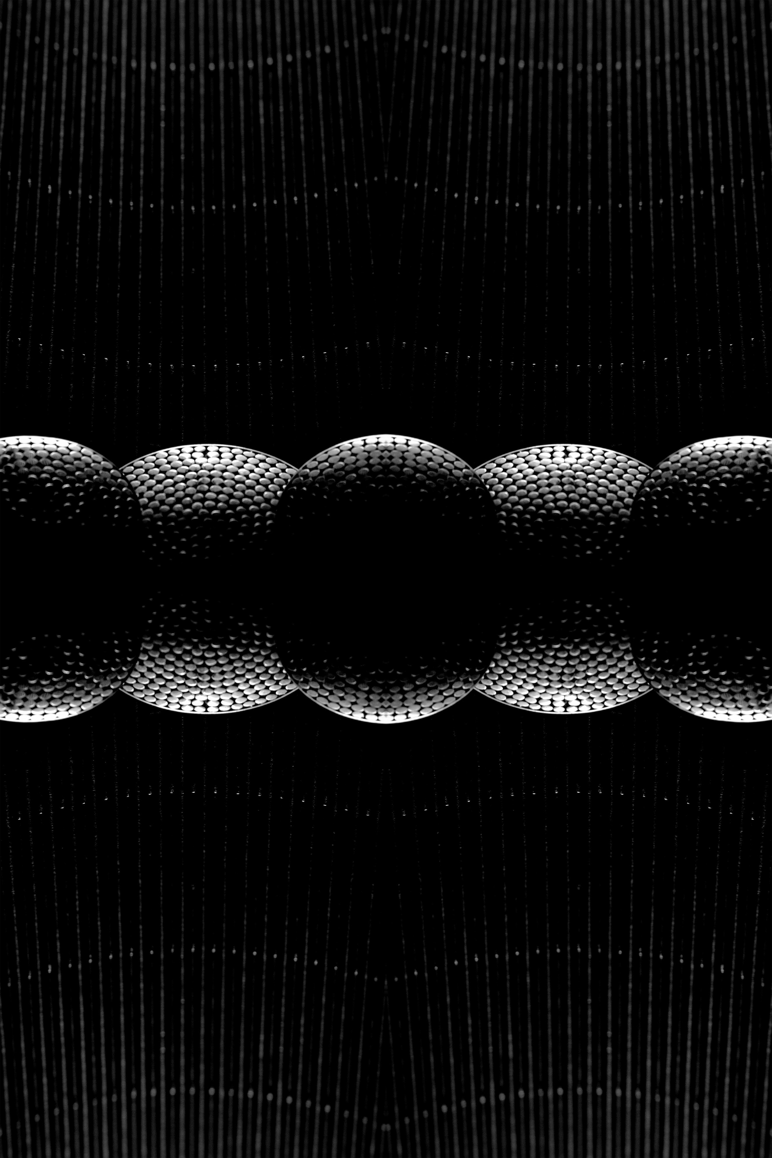Monochrome Orbs: A Symmetric Field of Textured Light