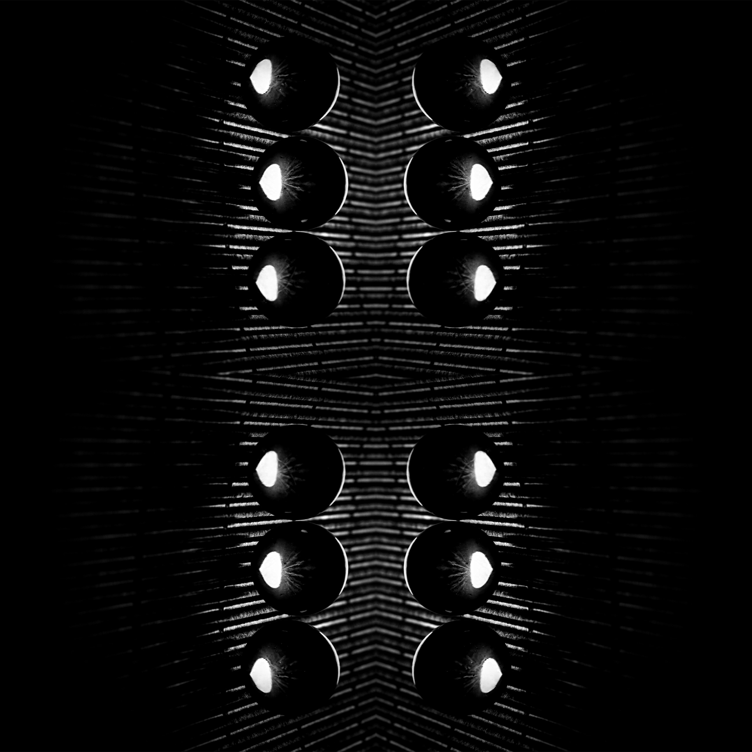 Symmetrical Orbs in Monochrome Grid
