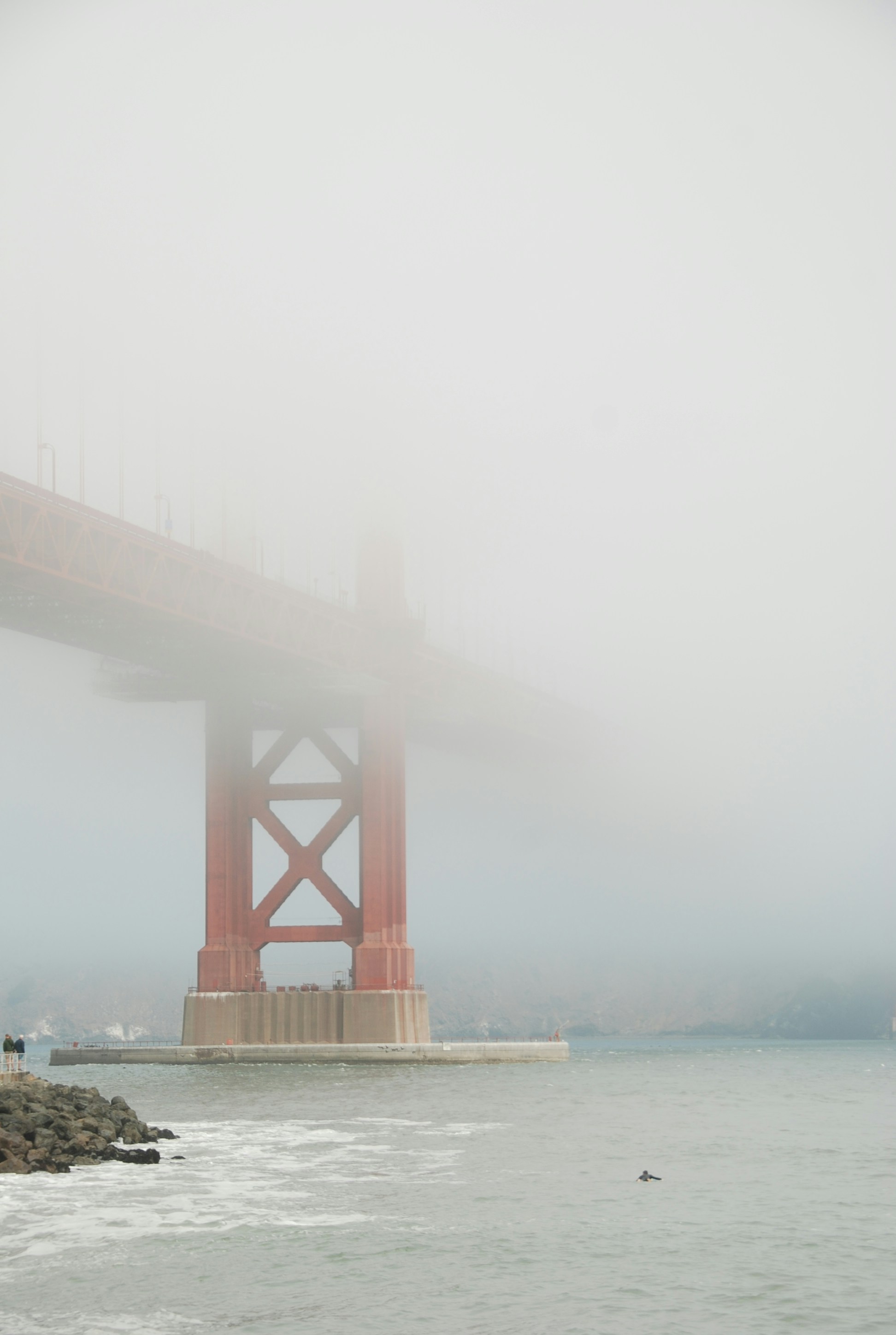 Fog-Softened Span: The Golden Gate Pier Vanishes into Mist