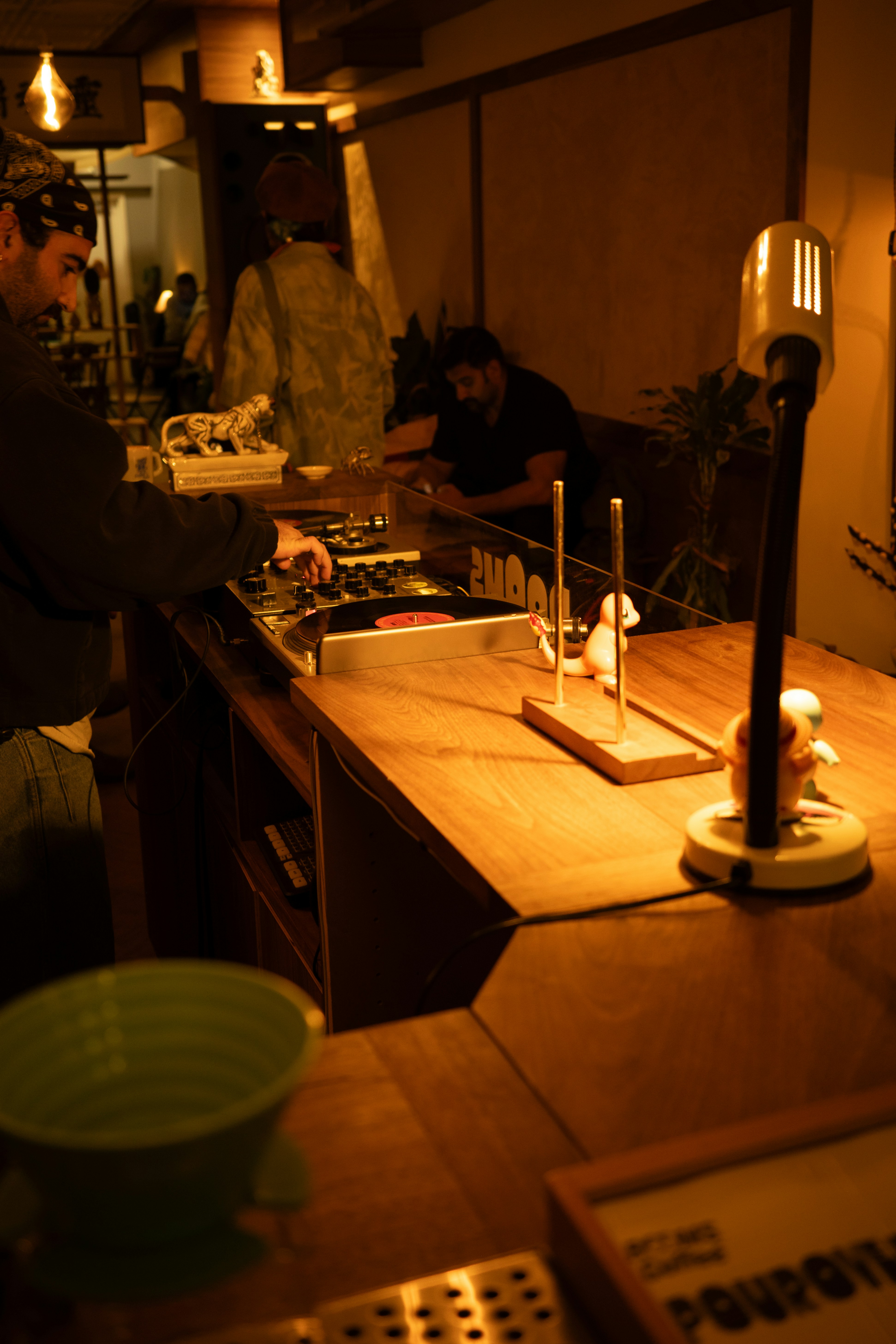 Warm Neon at the Counter: A Night at the Local Record Café