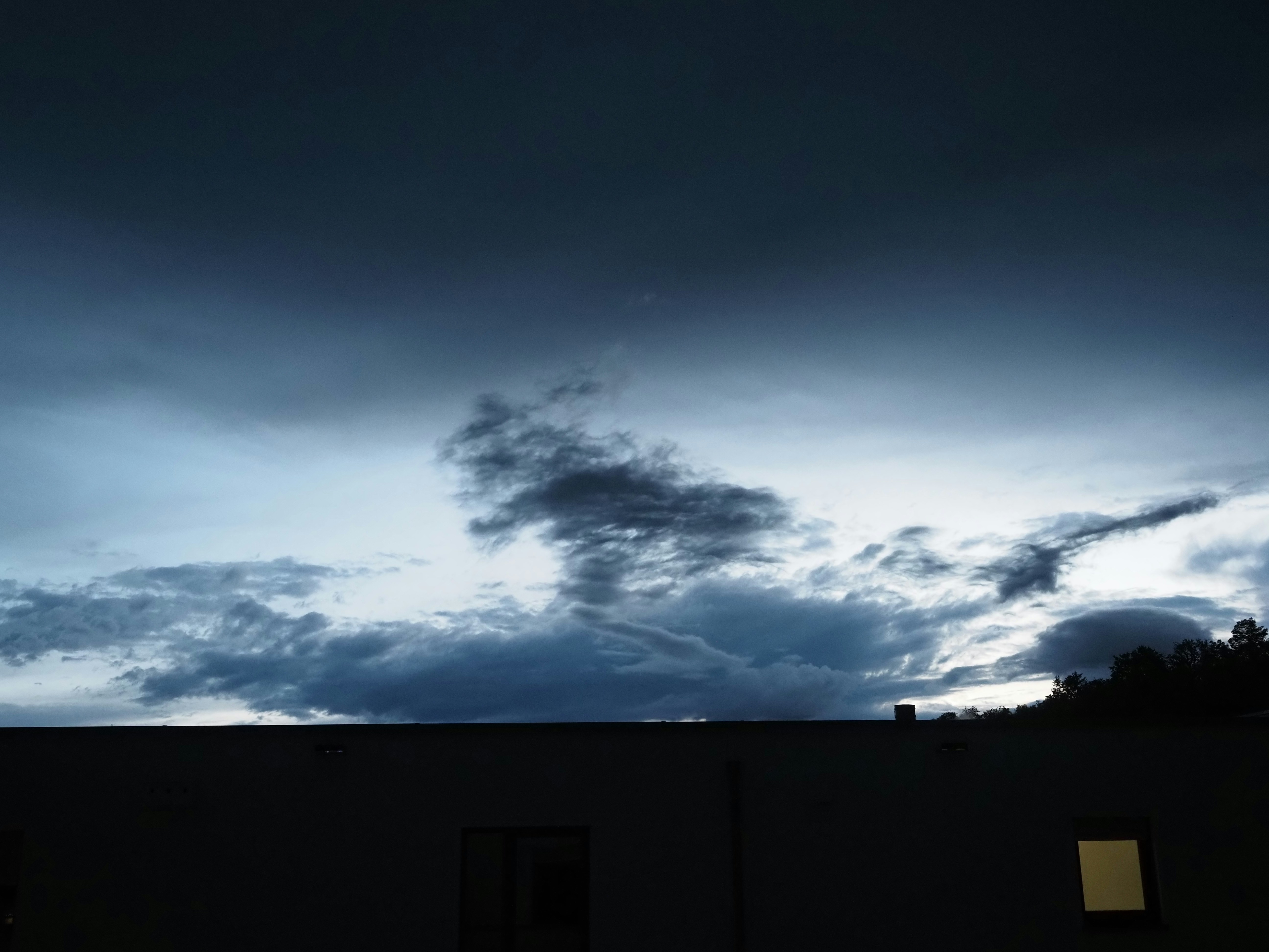 Dusk Horizon Over a Quiet Building